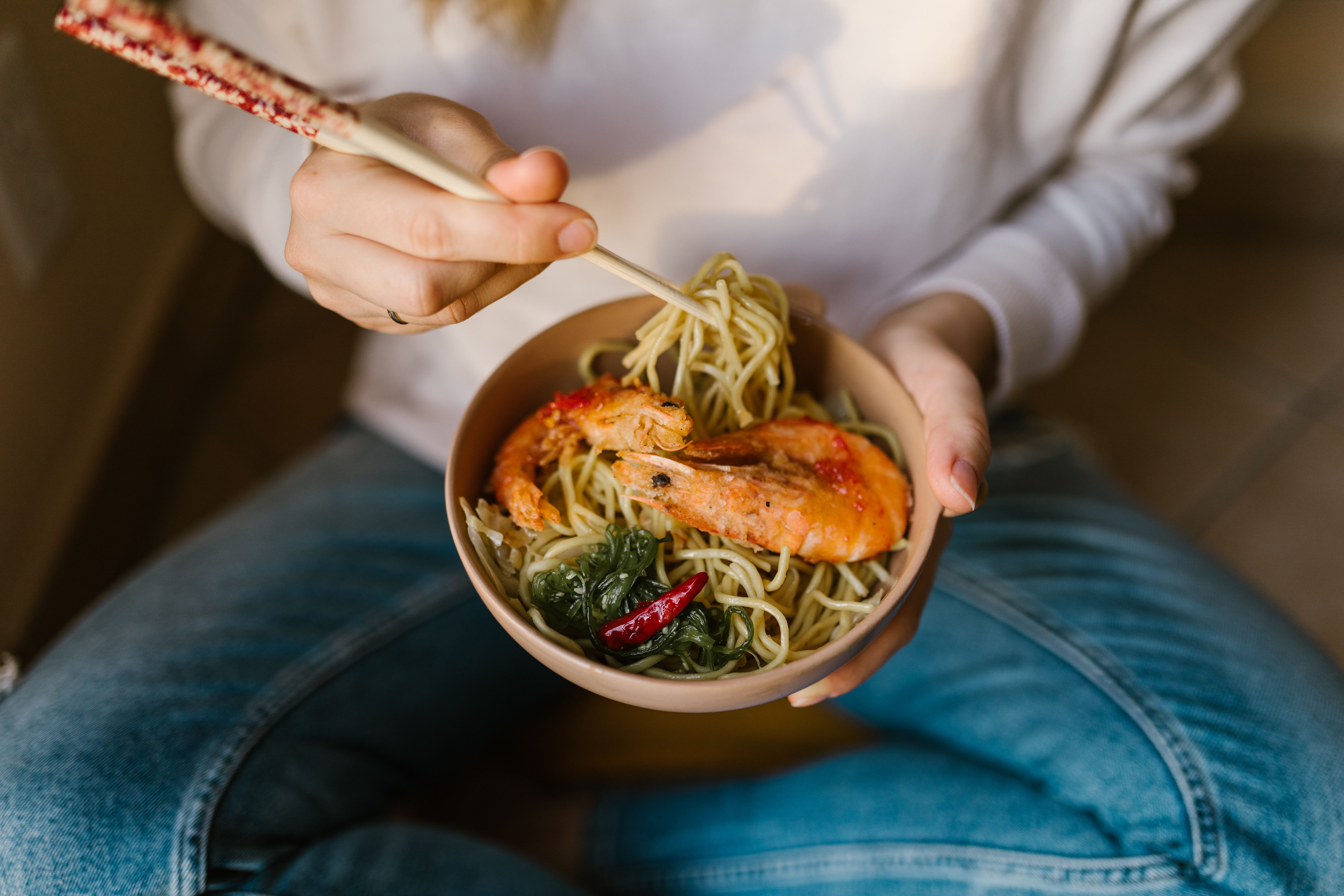 A Person Holding Chopsticks · Free Stock Photo