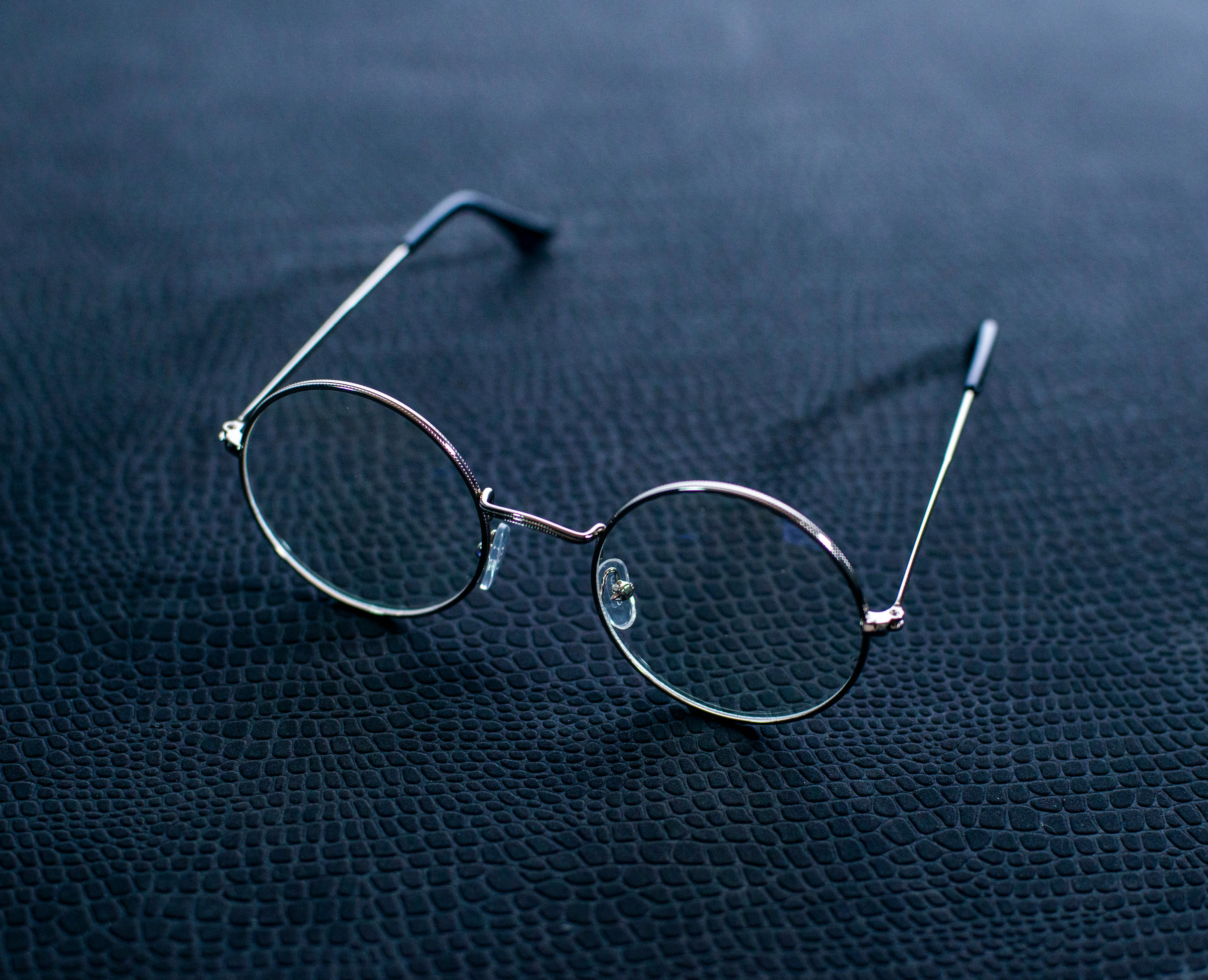 Brown-Framed Eyeglasses on a Calendar · Free Stock Photo
