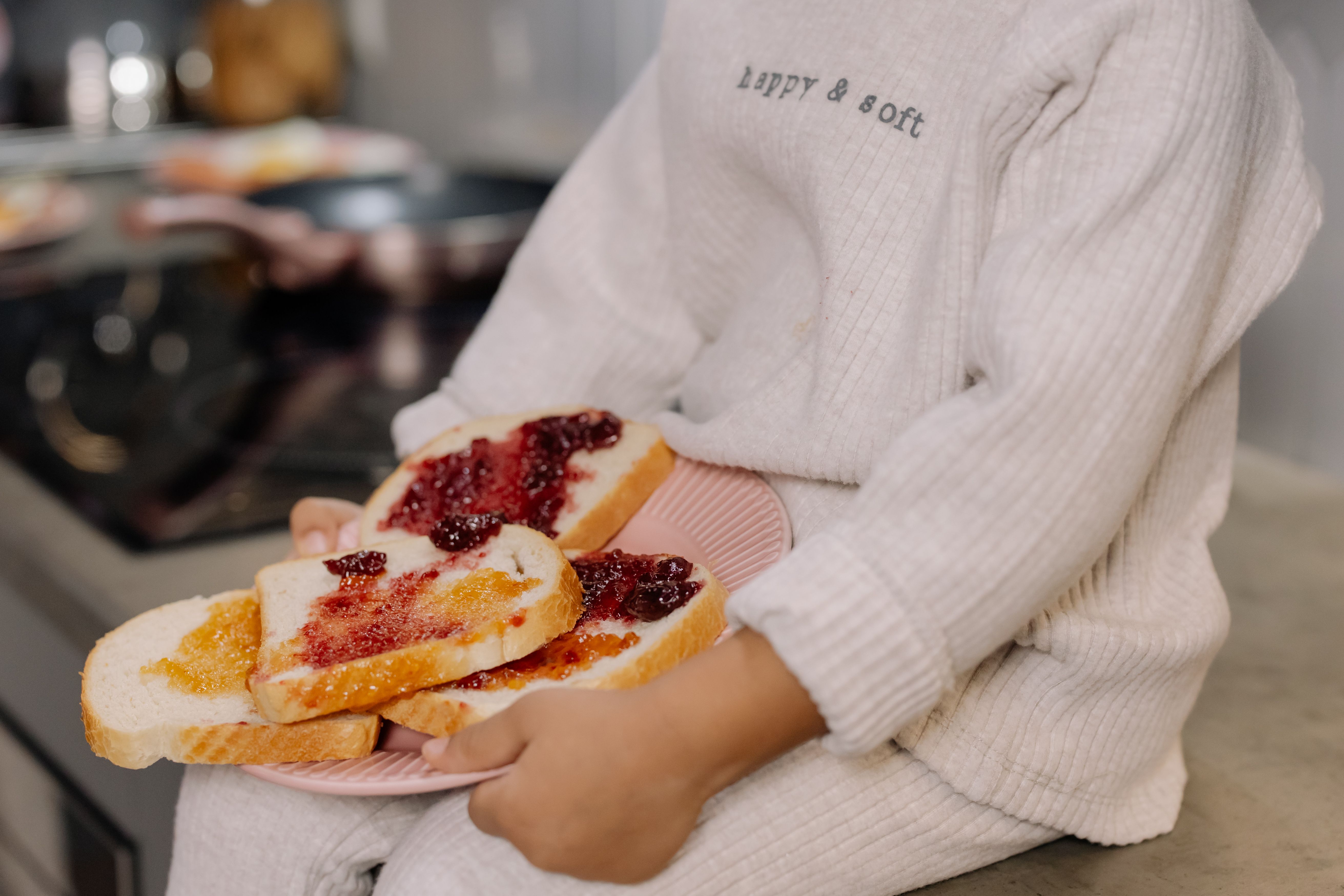 Close Up Shot of a Kid Holding Plate · Free Stock Photo