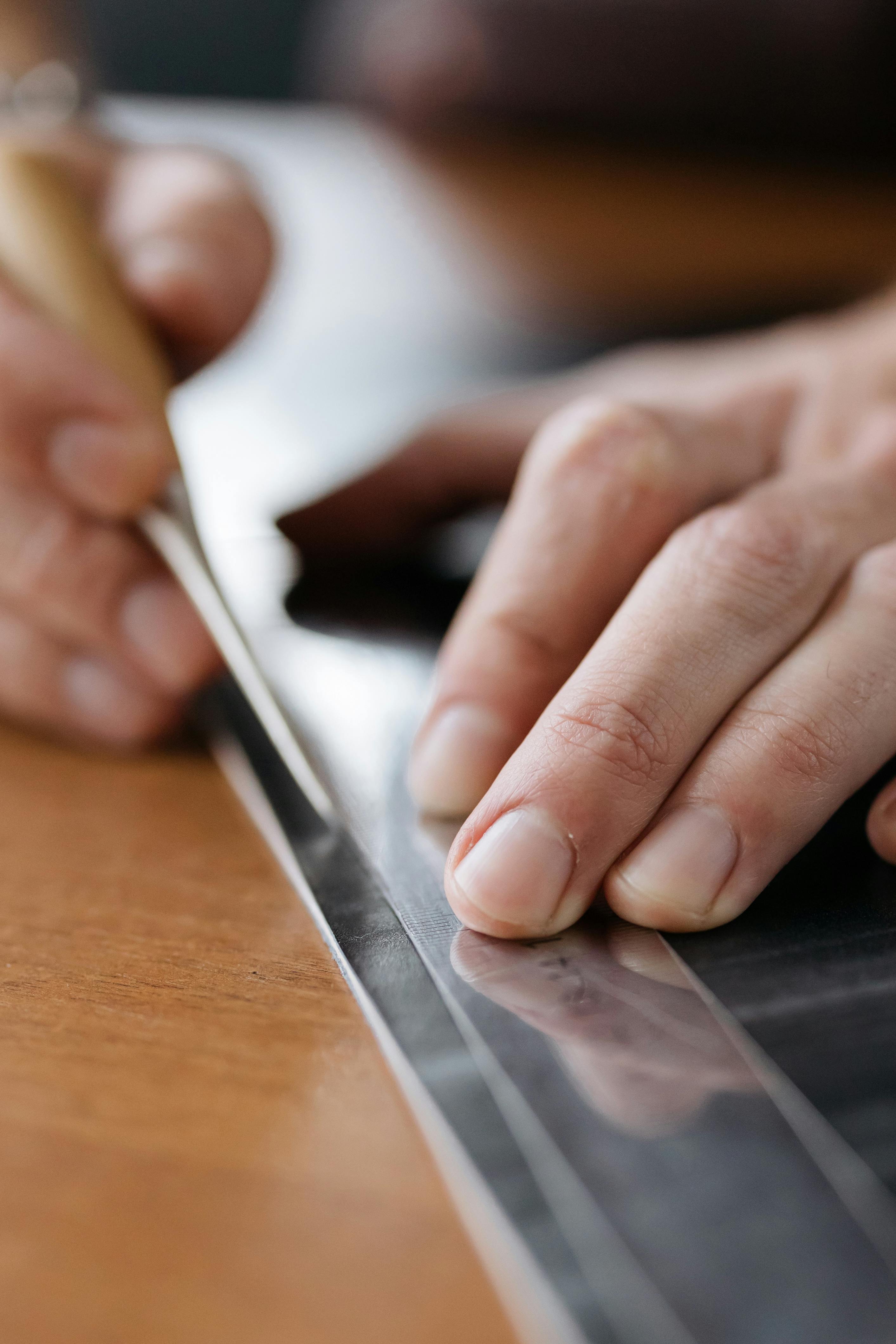 A Person Holding a Tool · Free Stock Photo