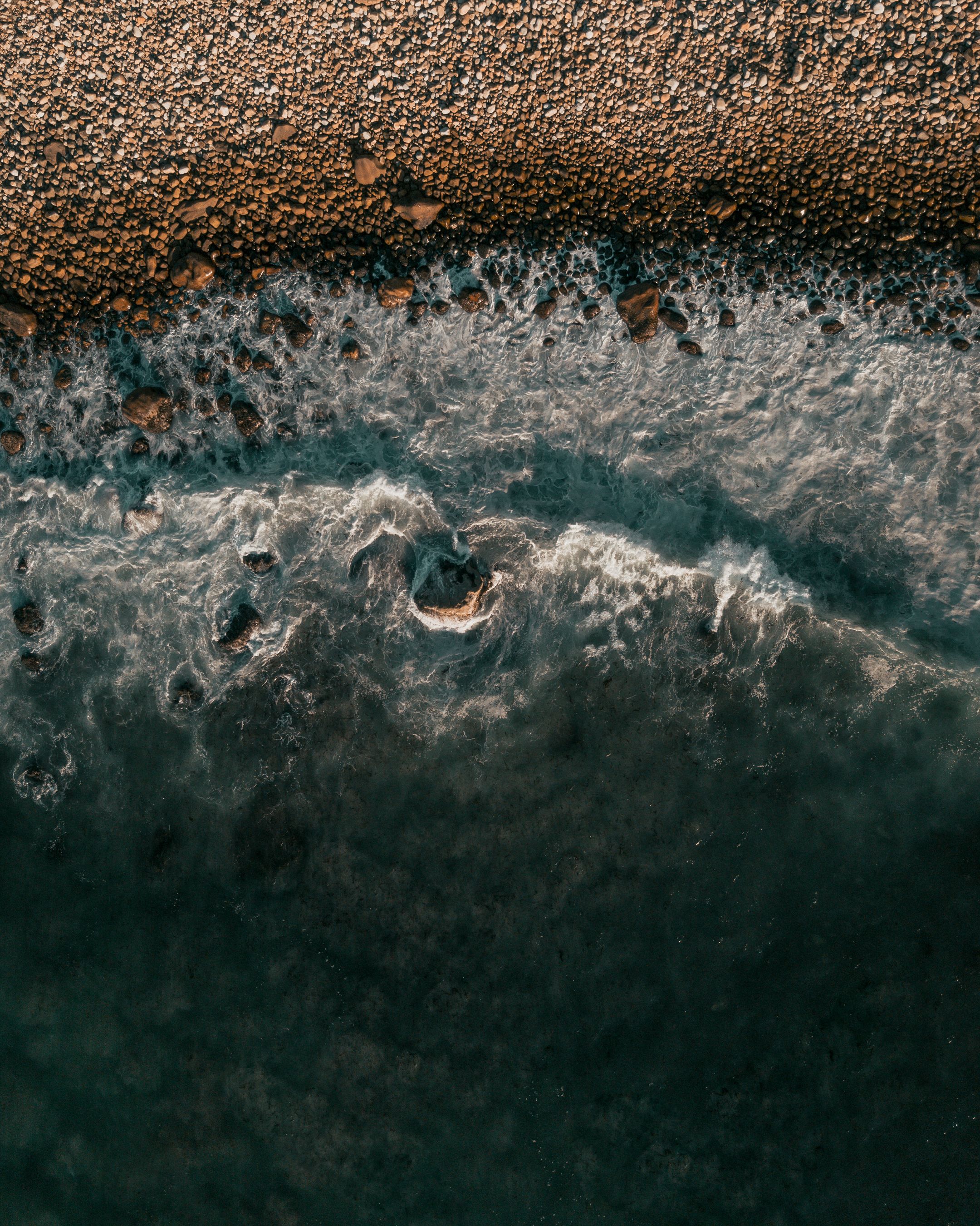 Drone Shot of a Ocean Waves on a Beach · Free Stock Photo