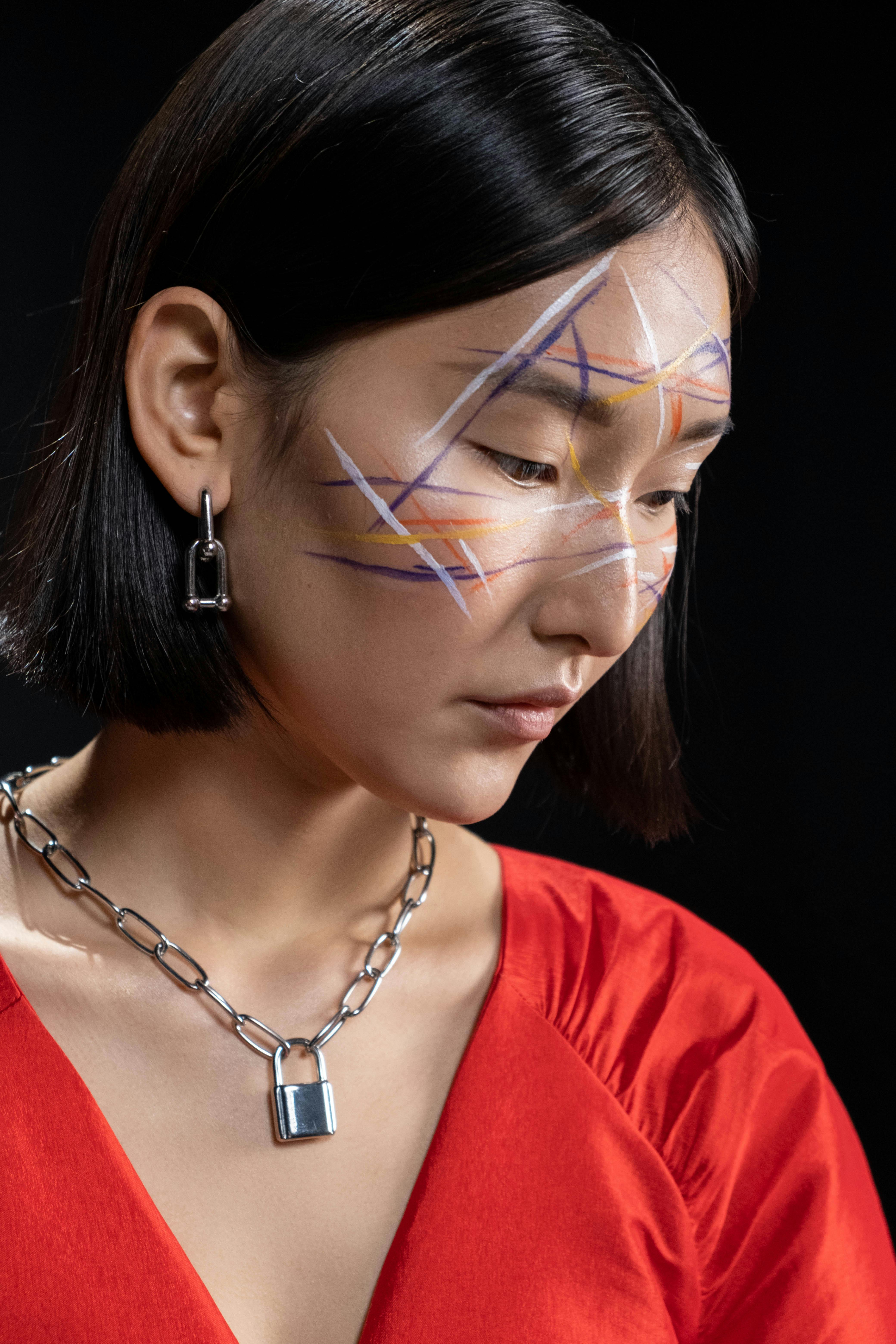 Person With Yellow Face Paint · Free Stock Photo