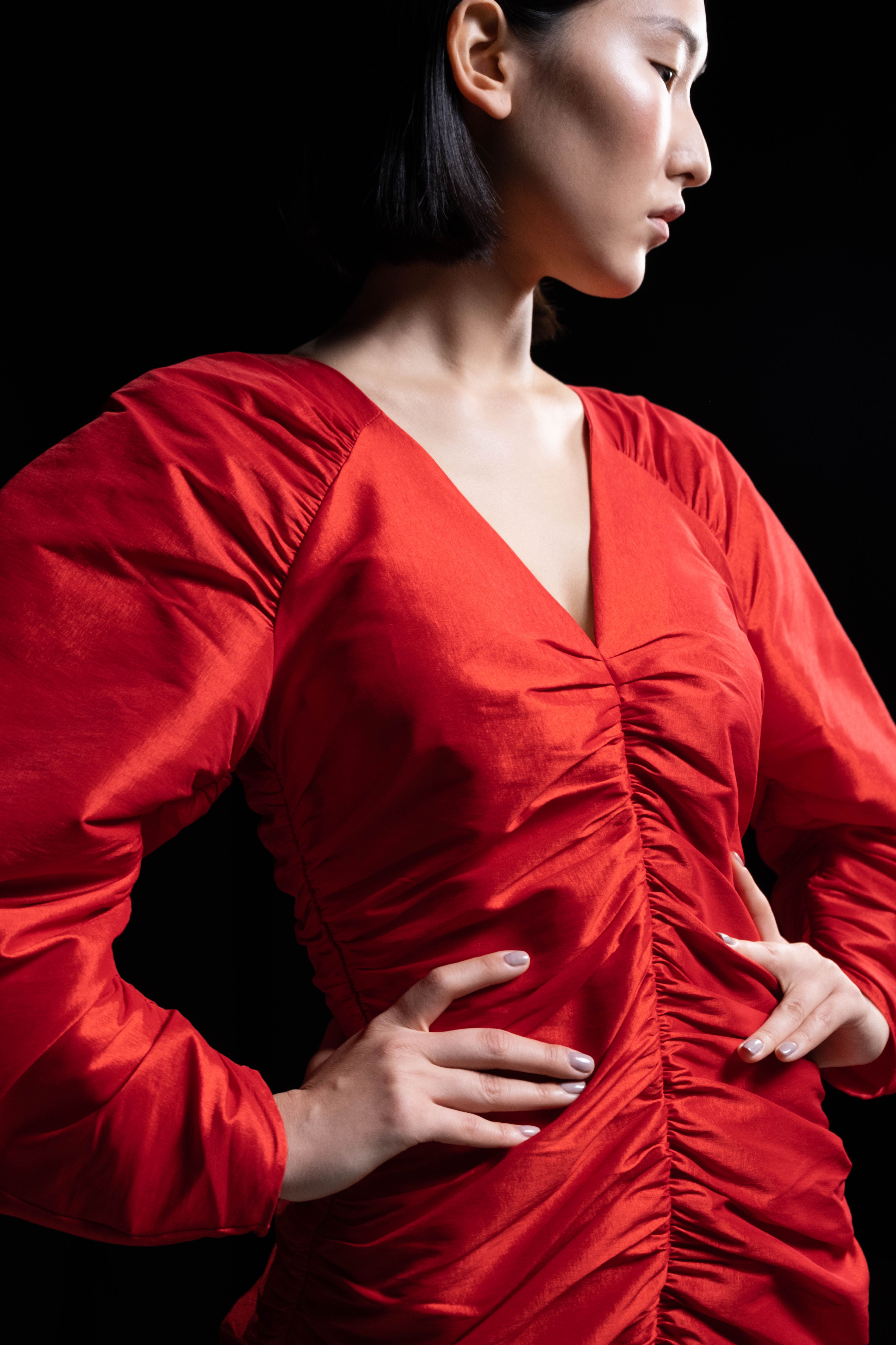 A Woman Wearing a Red Dress · Free Stock Photo