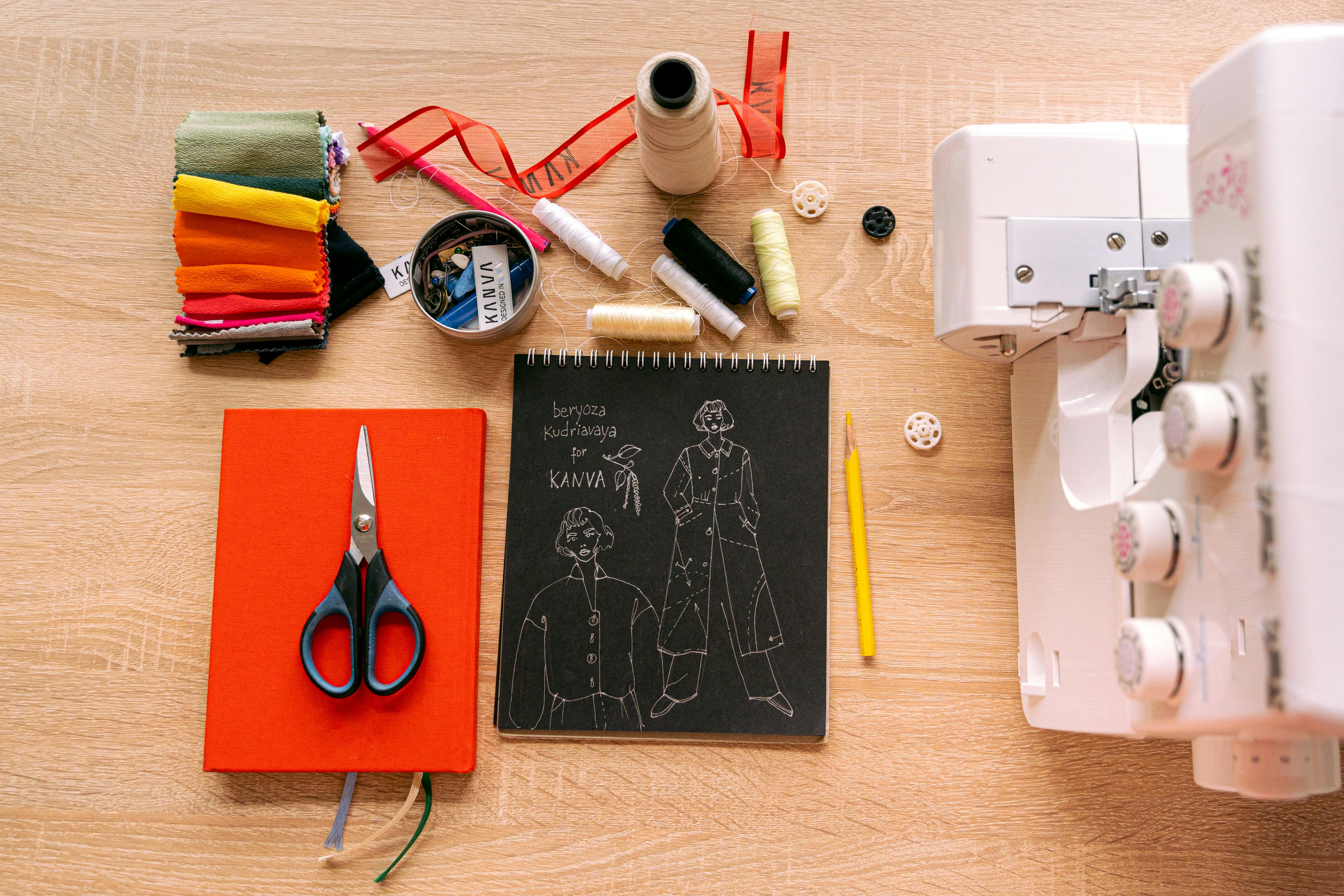 Close-Up Shot of Sewing Tools on a Wooden Surface · Free Stock Photo