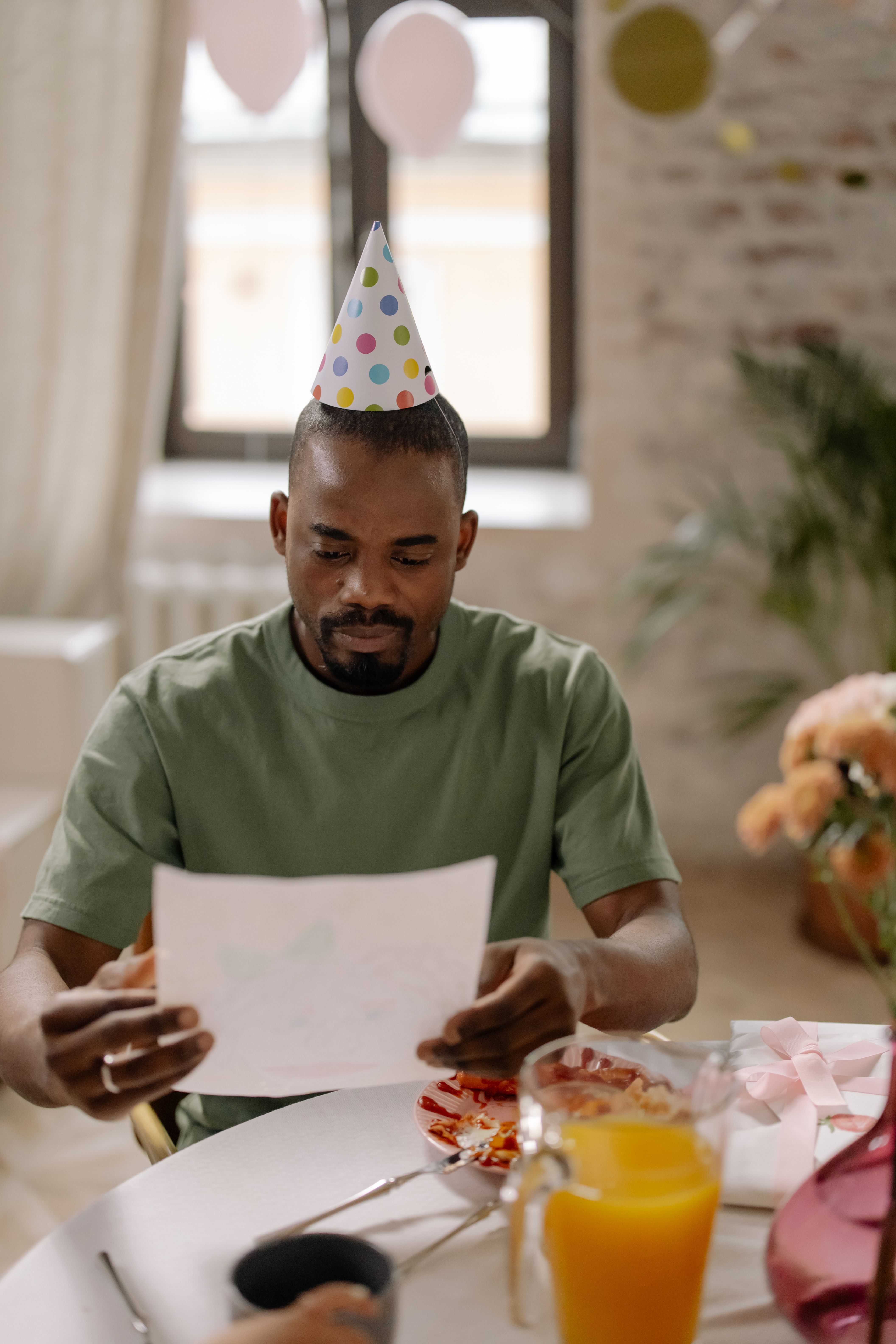 Man Wearing a Party Hat · Free Stock Photo