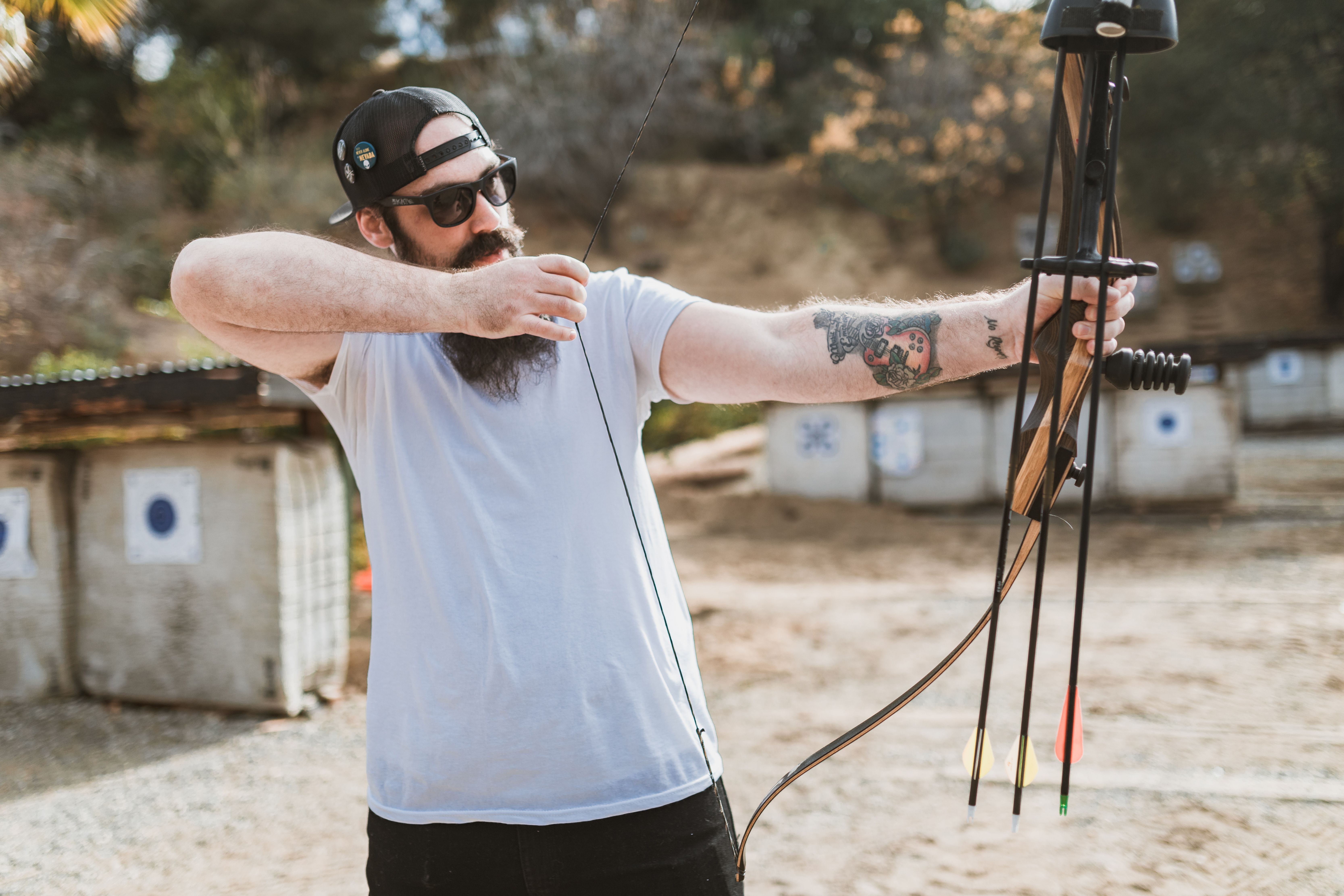 Photo of Target Shooting Papers With Holes · Free Stock Photo