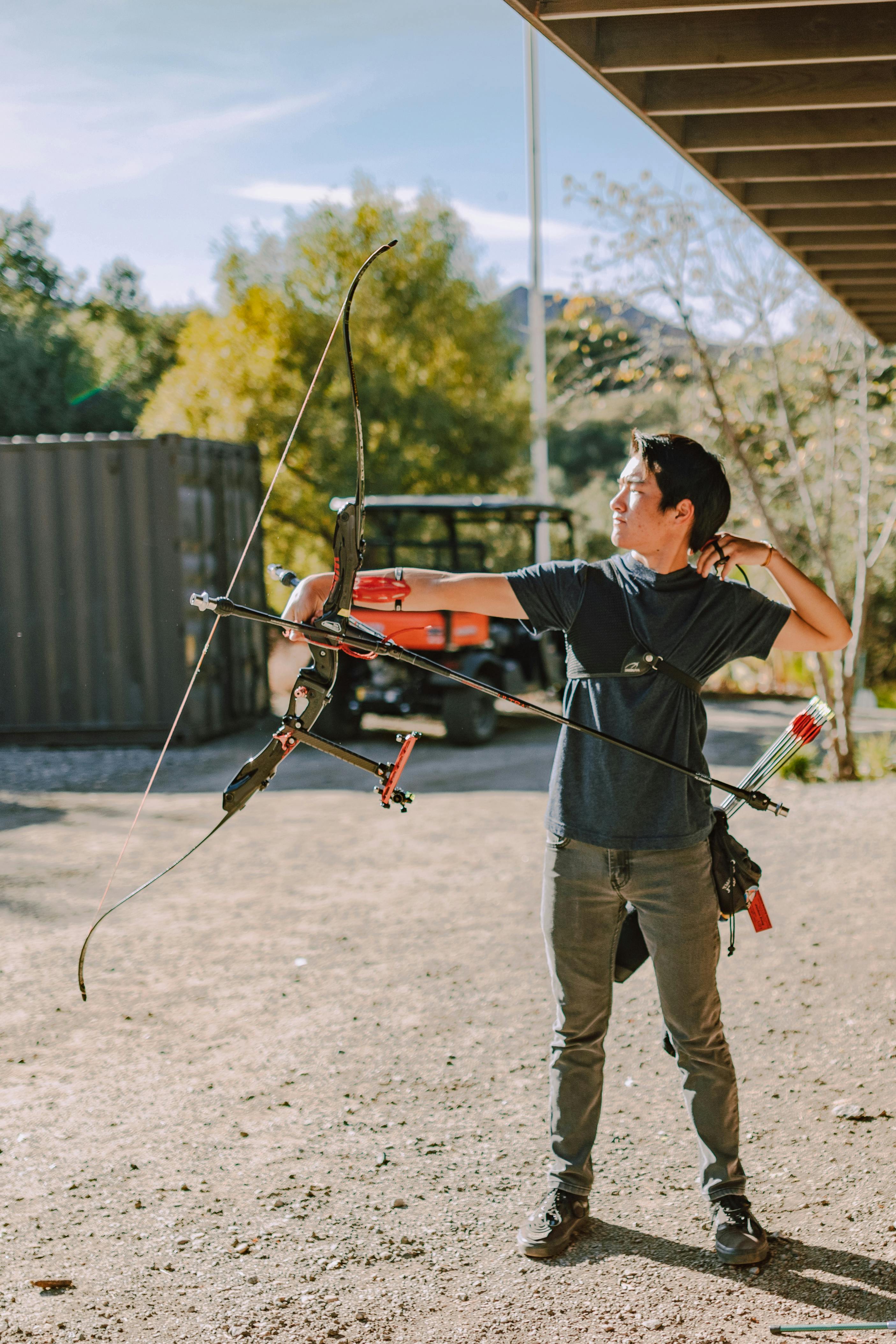 A Young Man Practicing Archery · Free Stock Photo