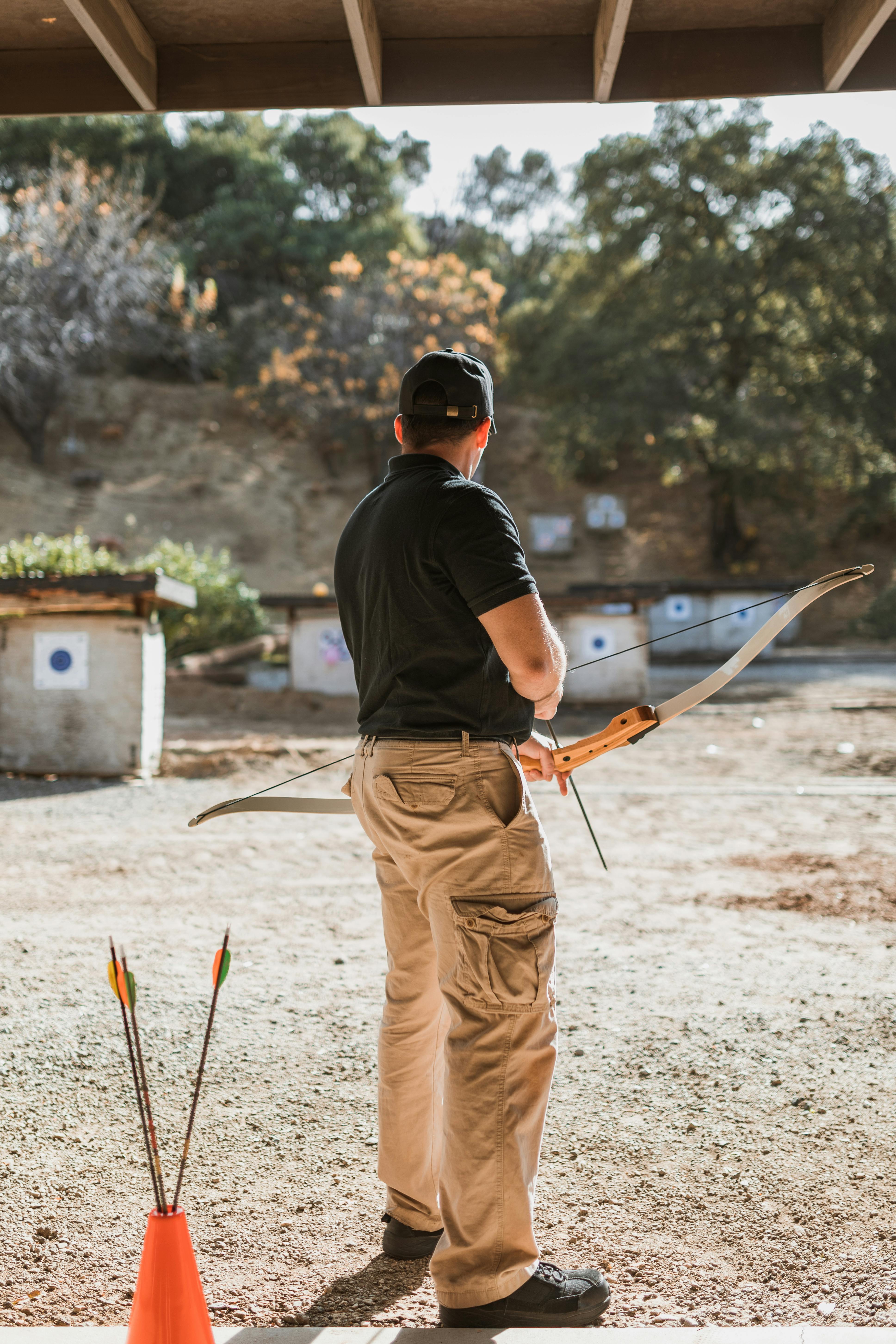 Archer aiming on an Archery Target · Free Stock Photo