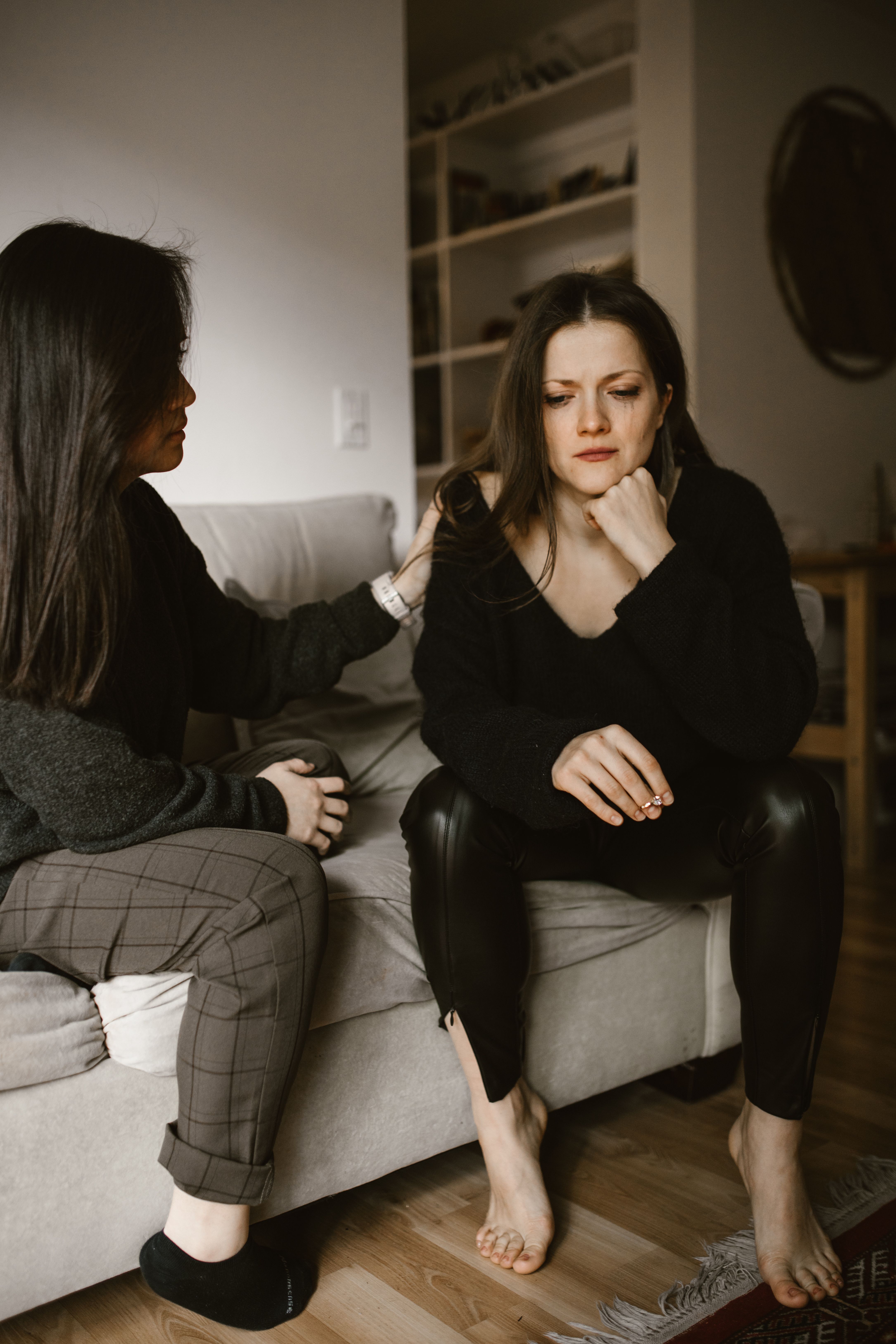 Women Crying while Holding Hands · Free Stock Photo