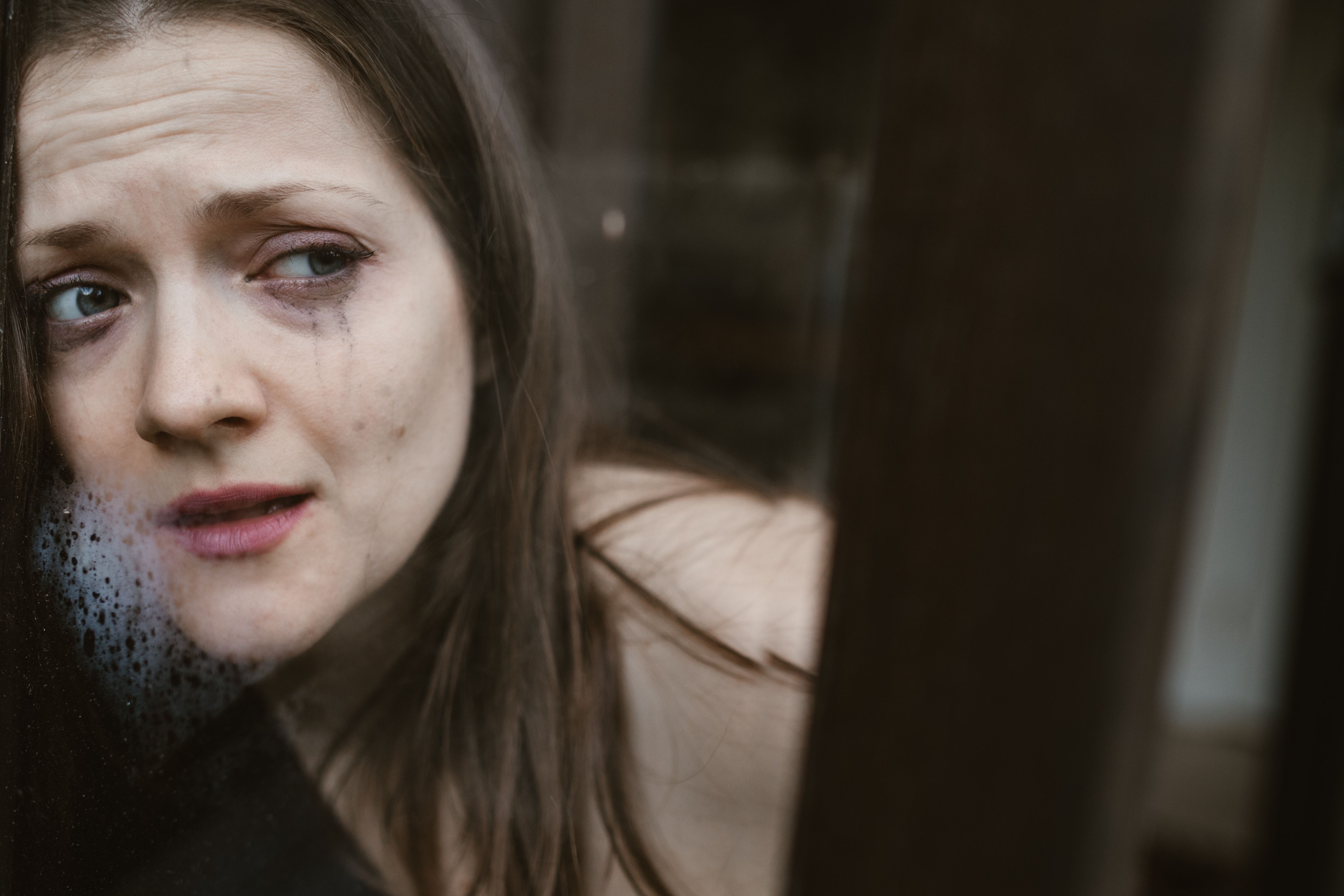Close-Up Shot of a Sad Face Woman · Free Stock Photo