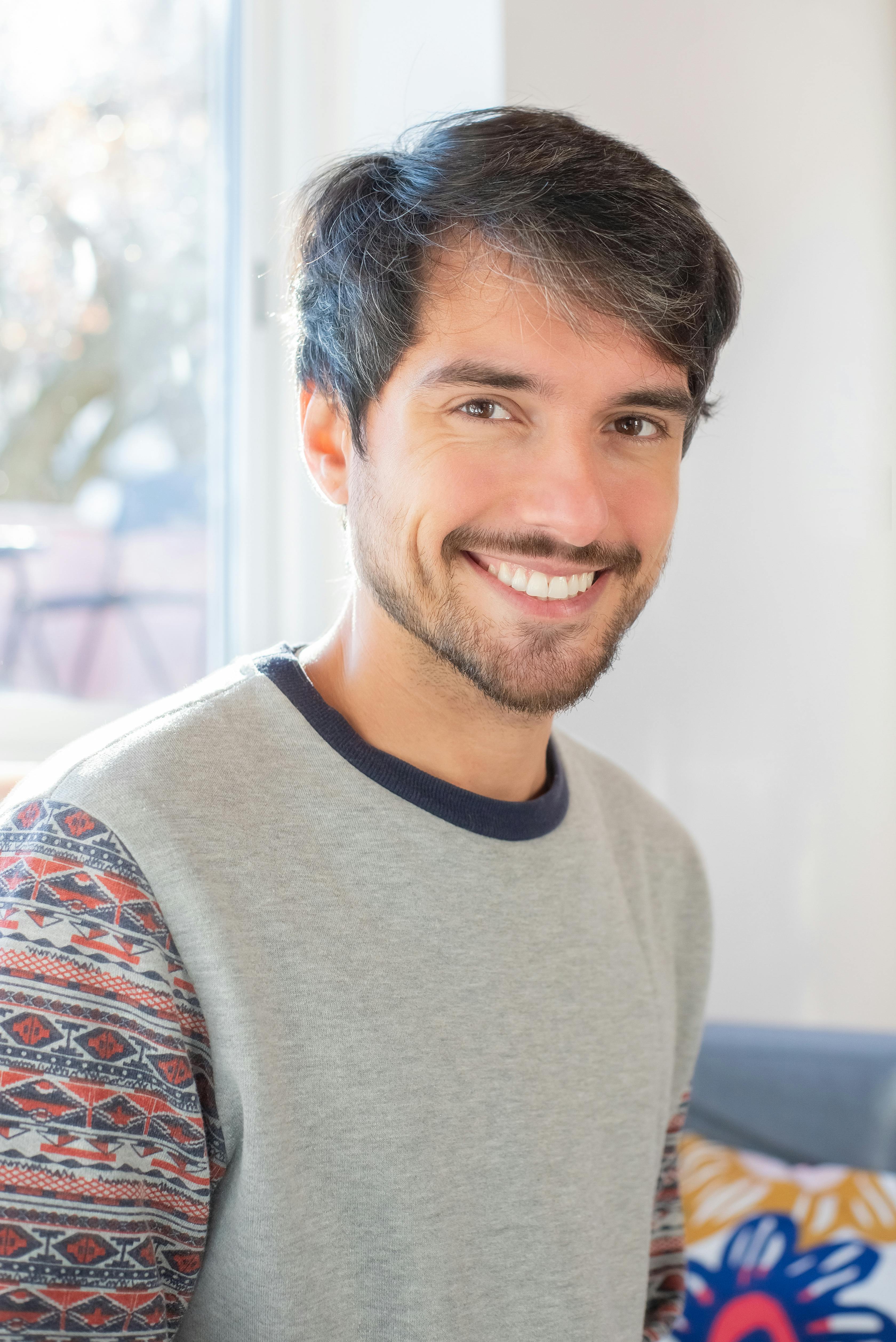 Portrait of a Man with Beautiful Smile · Free Stock Photo
