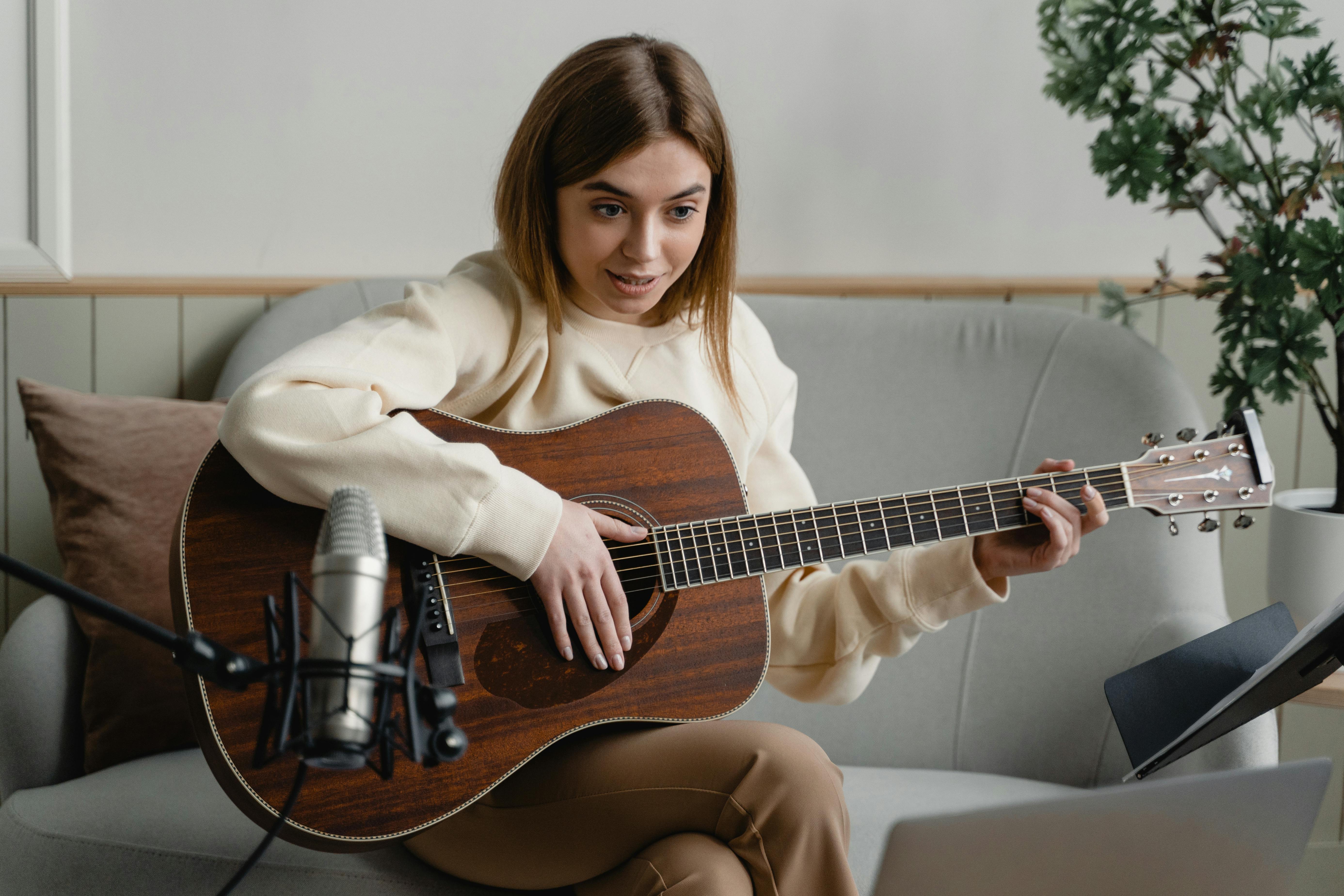 A Woman Playing Guitar · Free Stock Photo
