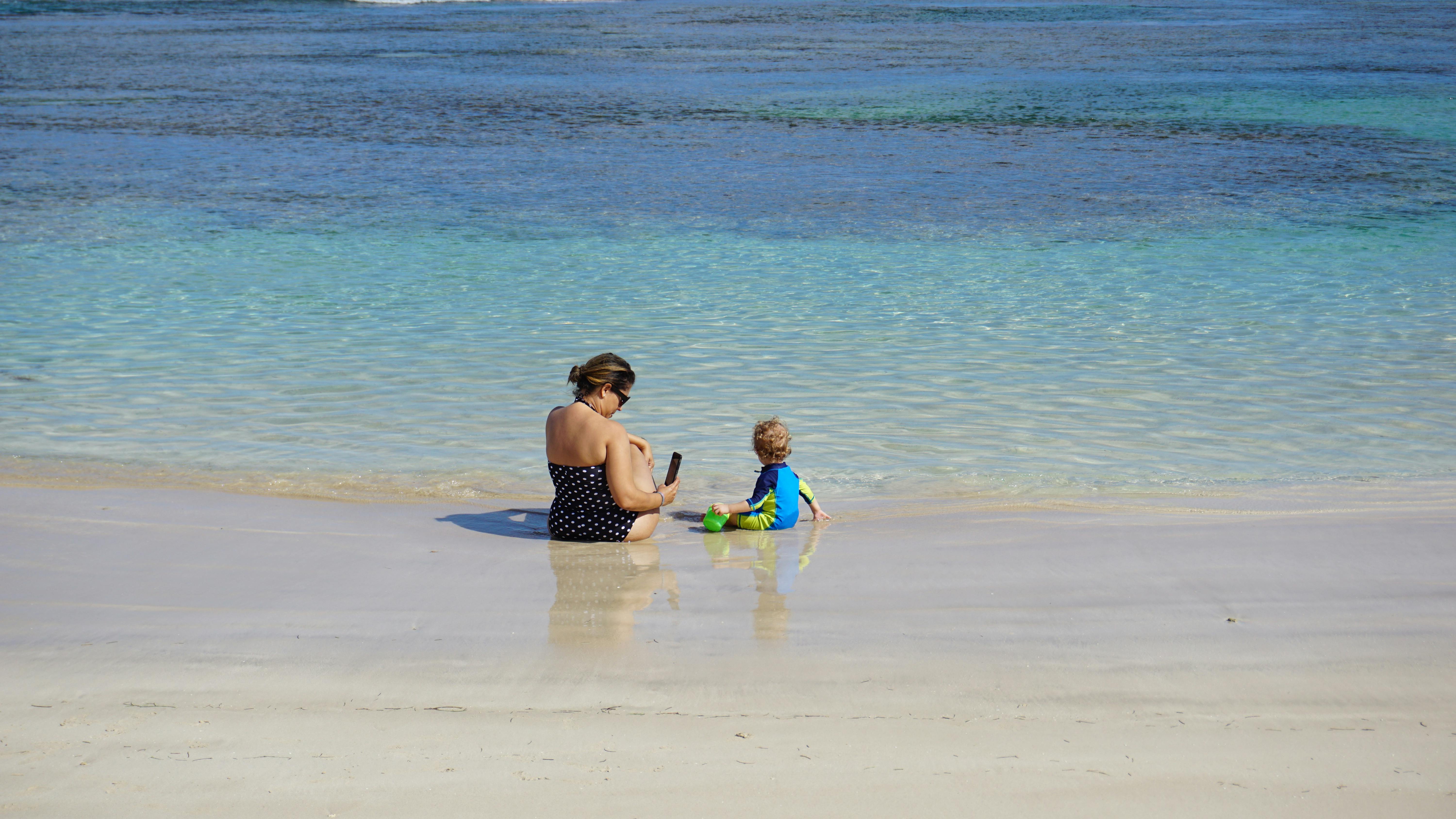 Kids Swimming on the Beach · Free Stock Photo