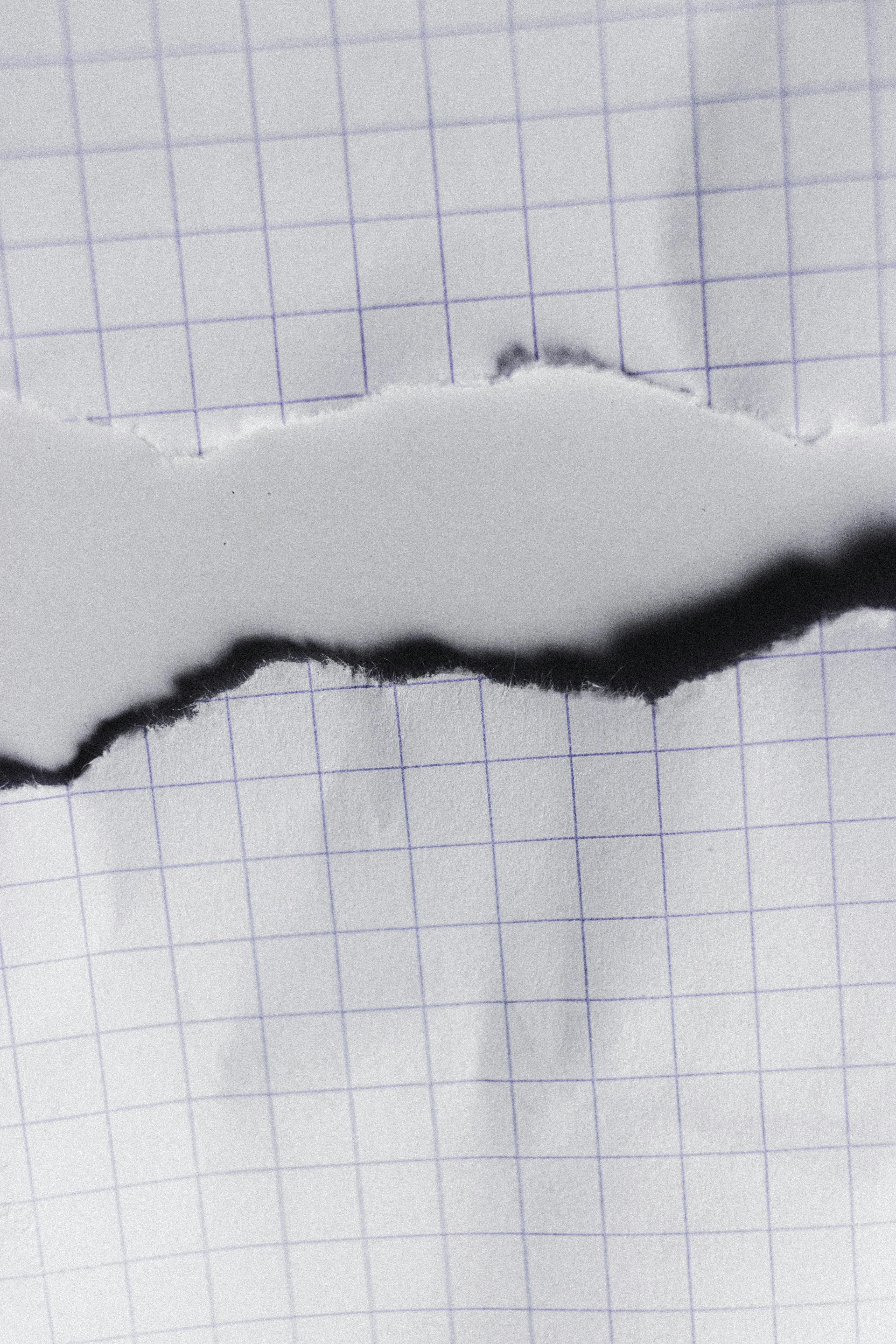 Background of ripped paper sheet with uneven surface · Free Stock Photo