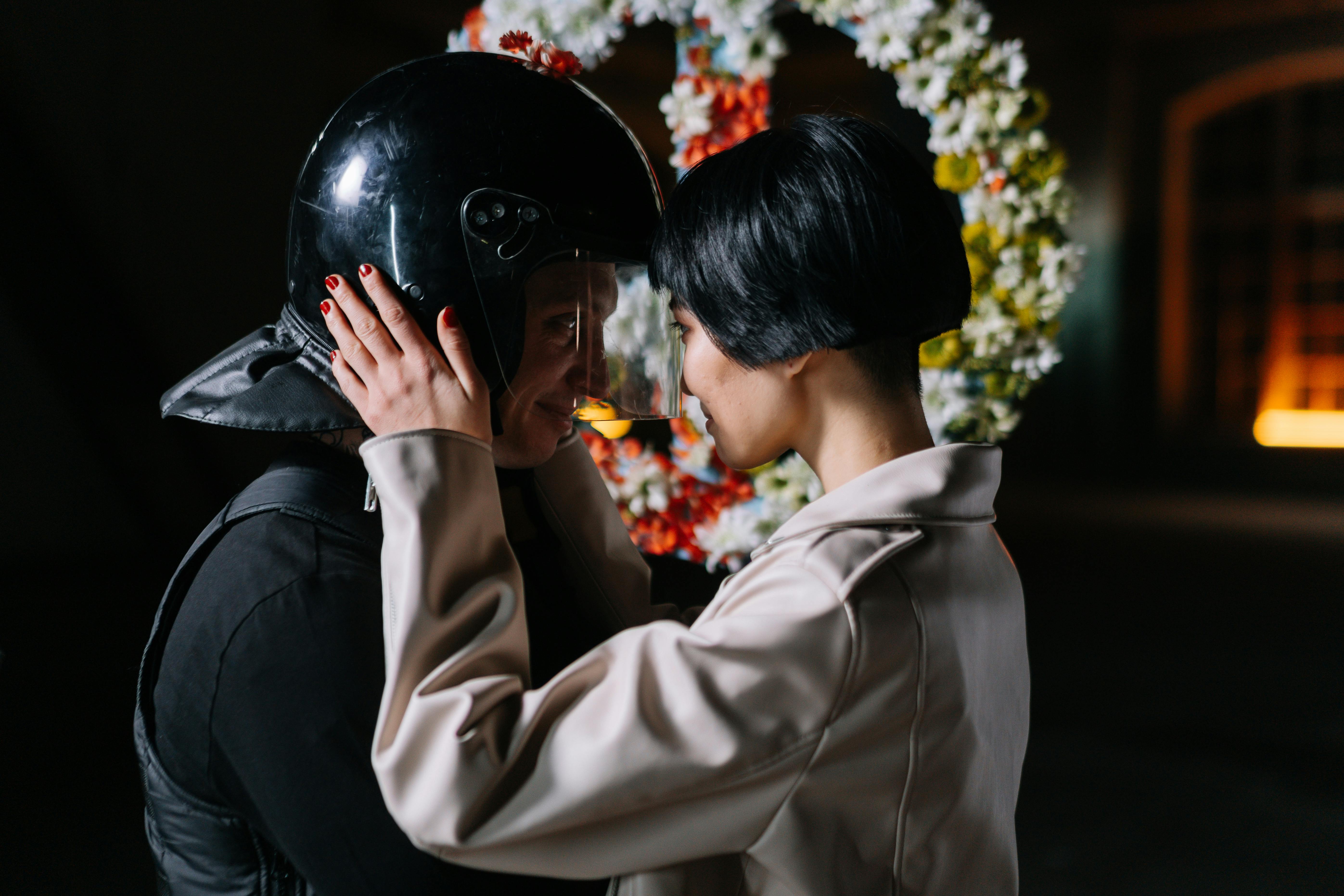 Man Removing His Helmet · Free Stock Photo