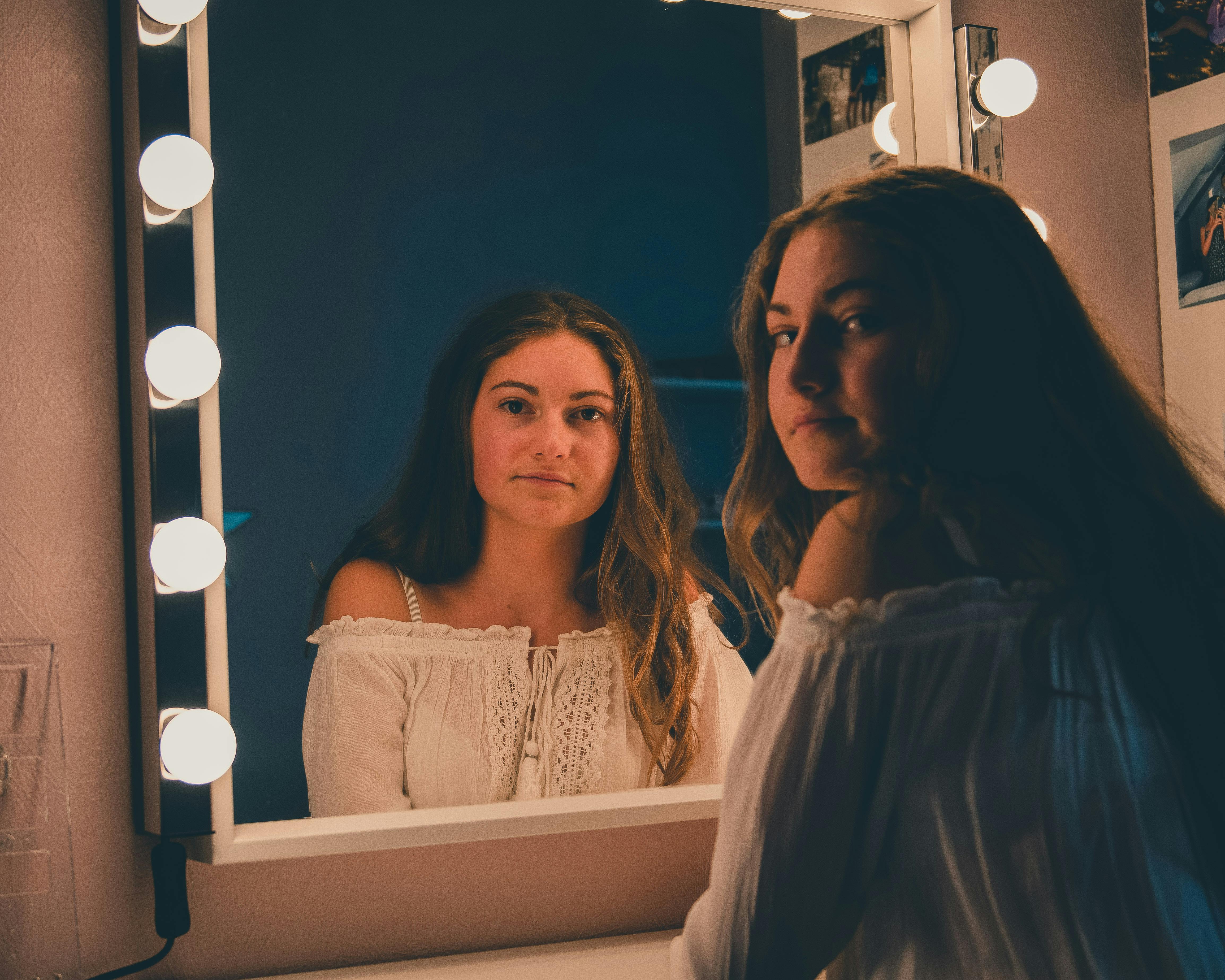 Reflection of a Woman in the Mirror · Free Stock Photo