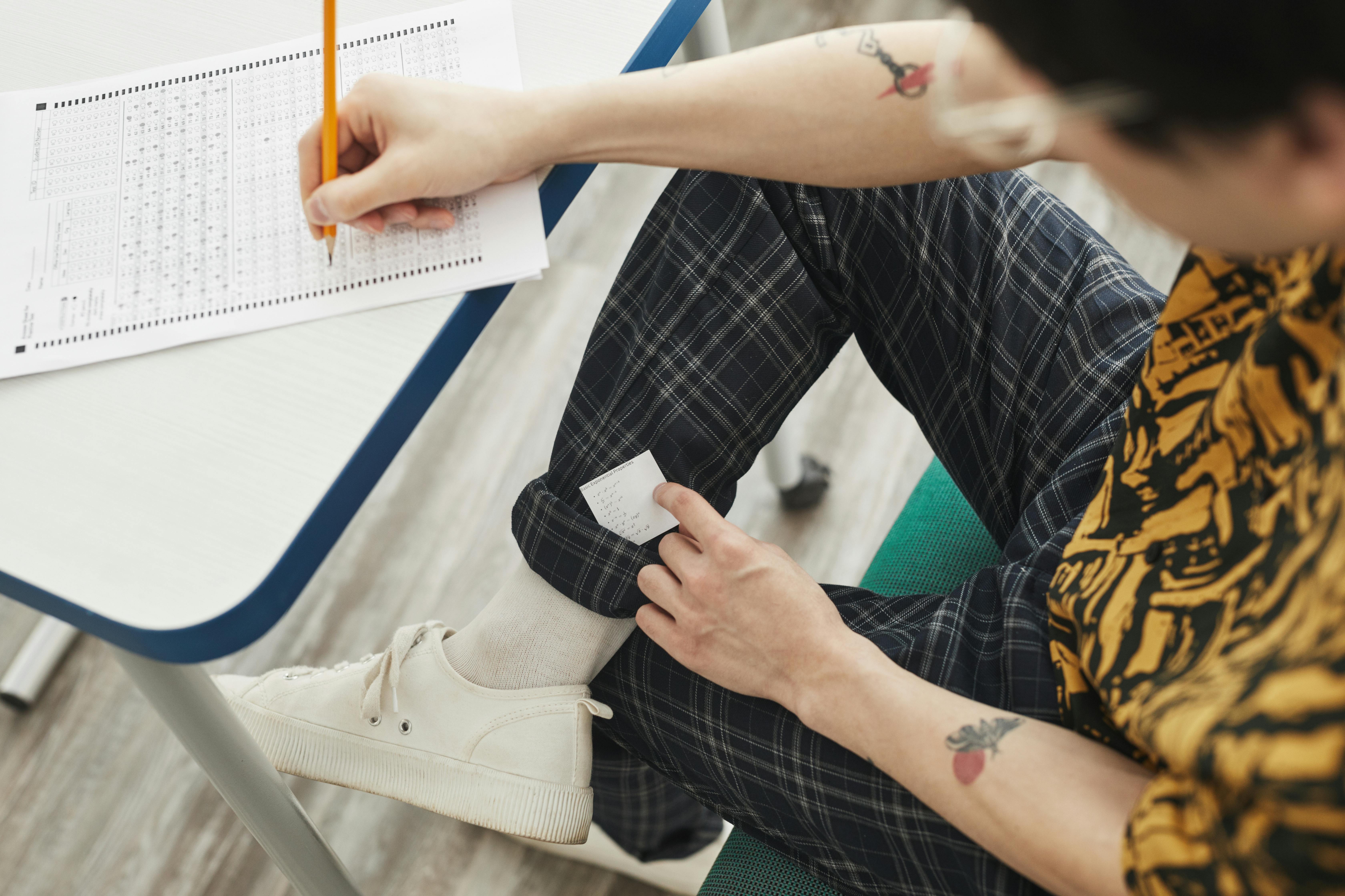 A Person Cheating on an Examination · Free Stock Photo