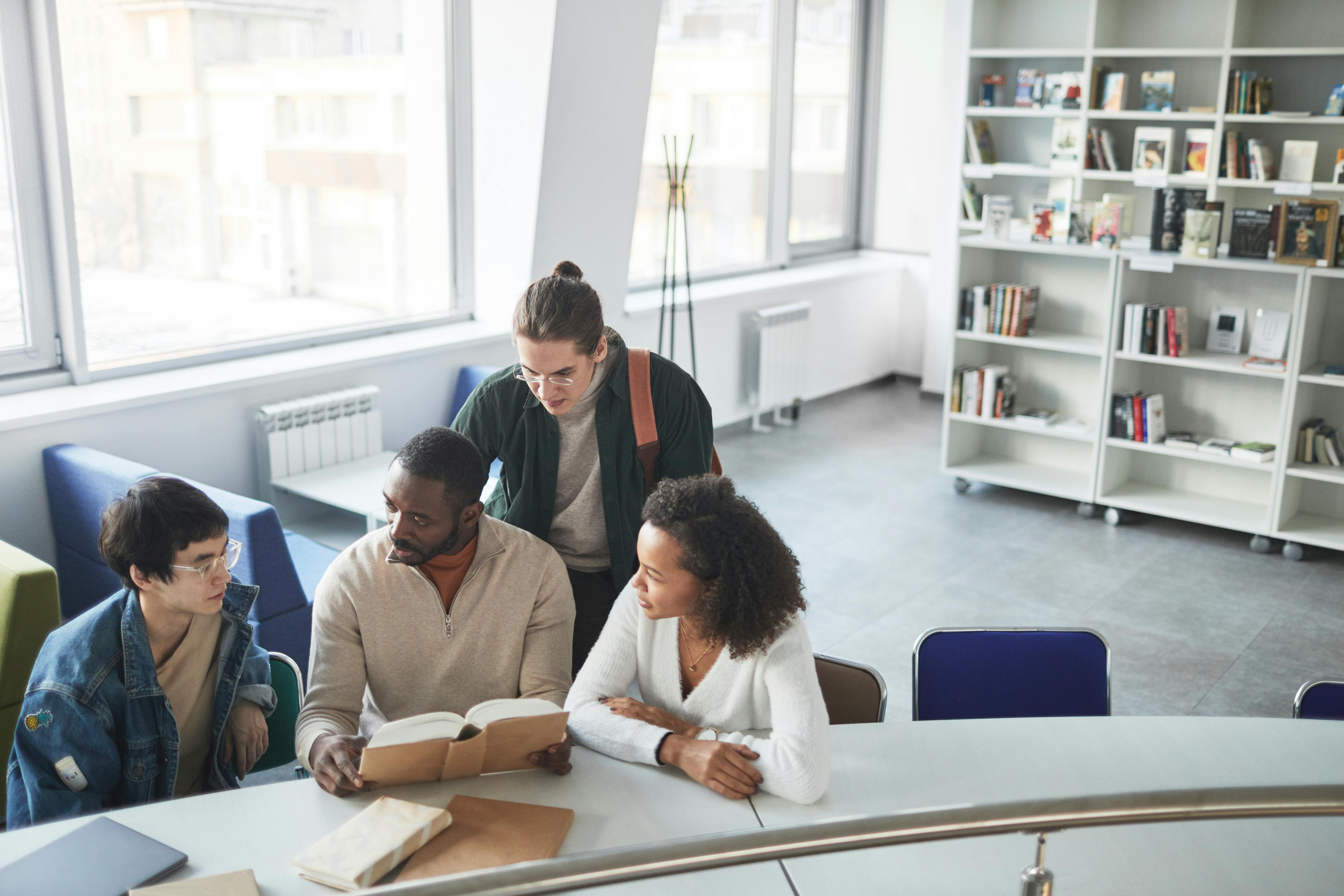 People in a Library · Free Stock Photo