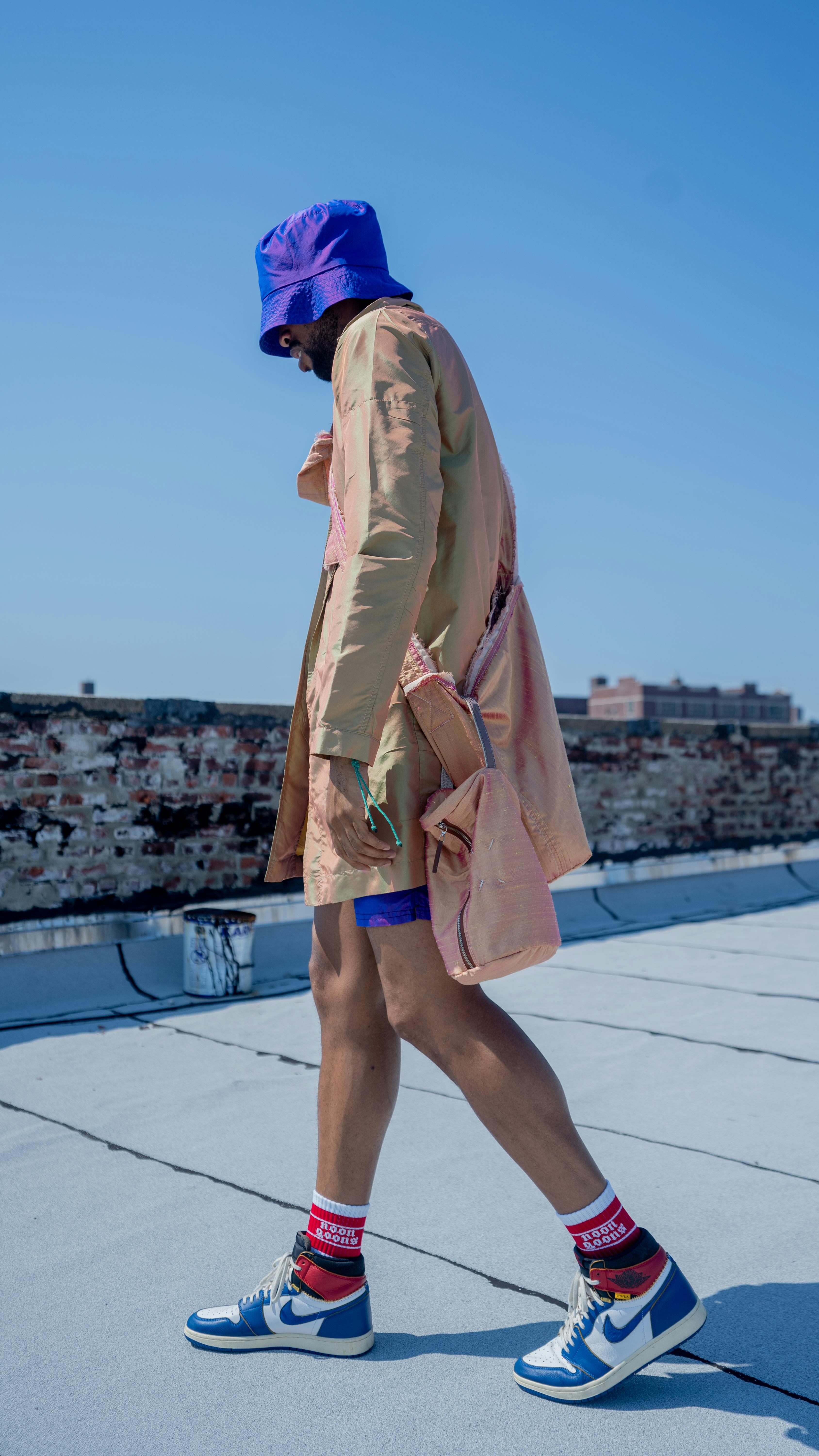 Person Wearing Blue Bucket Hat · Free Stock Photo