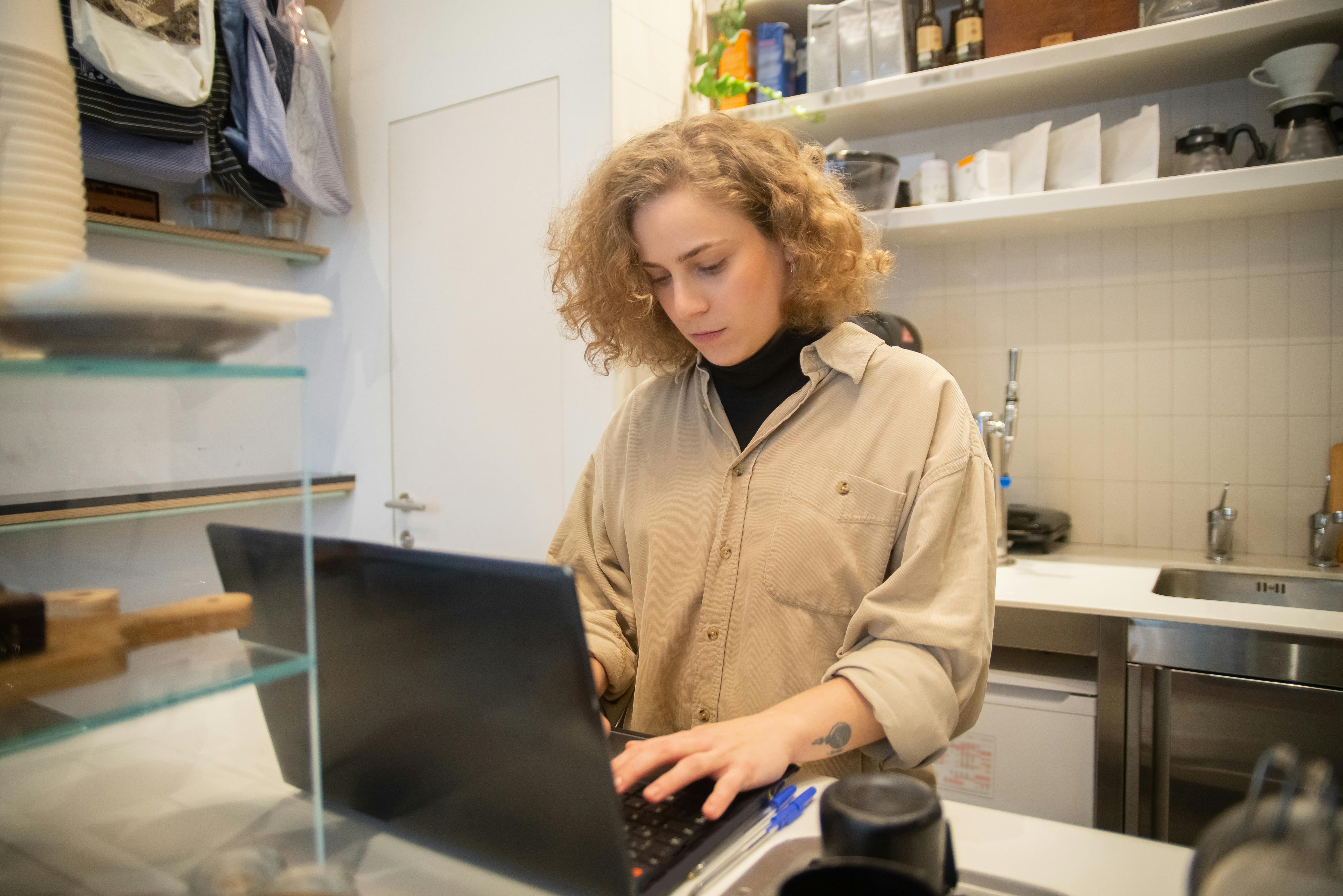 Photo of a Woman Using Laptop · Free Stock Photo