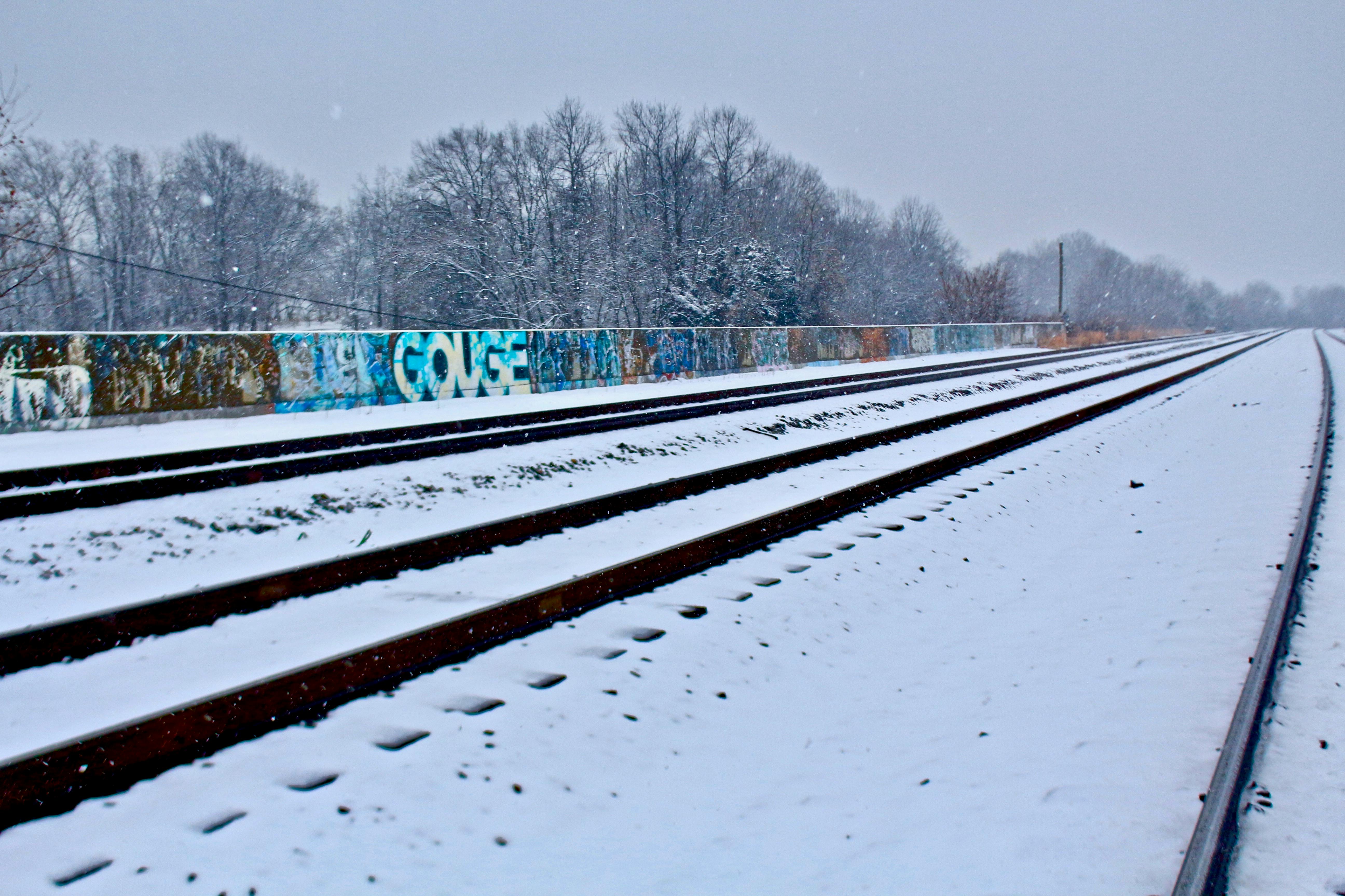Railroad Tracks Covered with Snow · Free Stock Photo