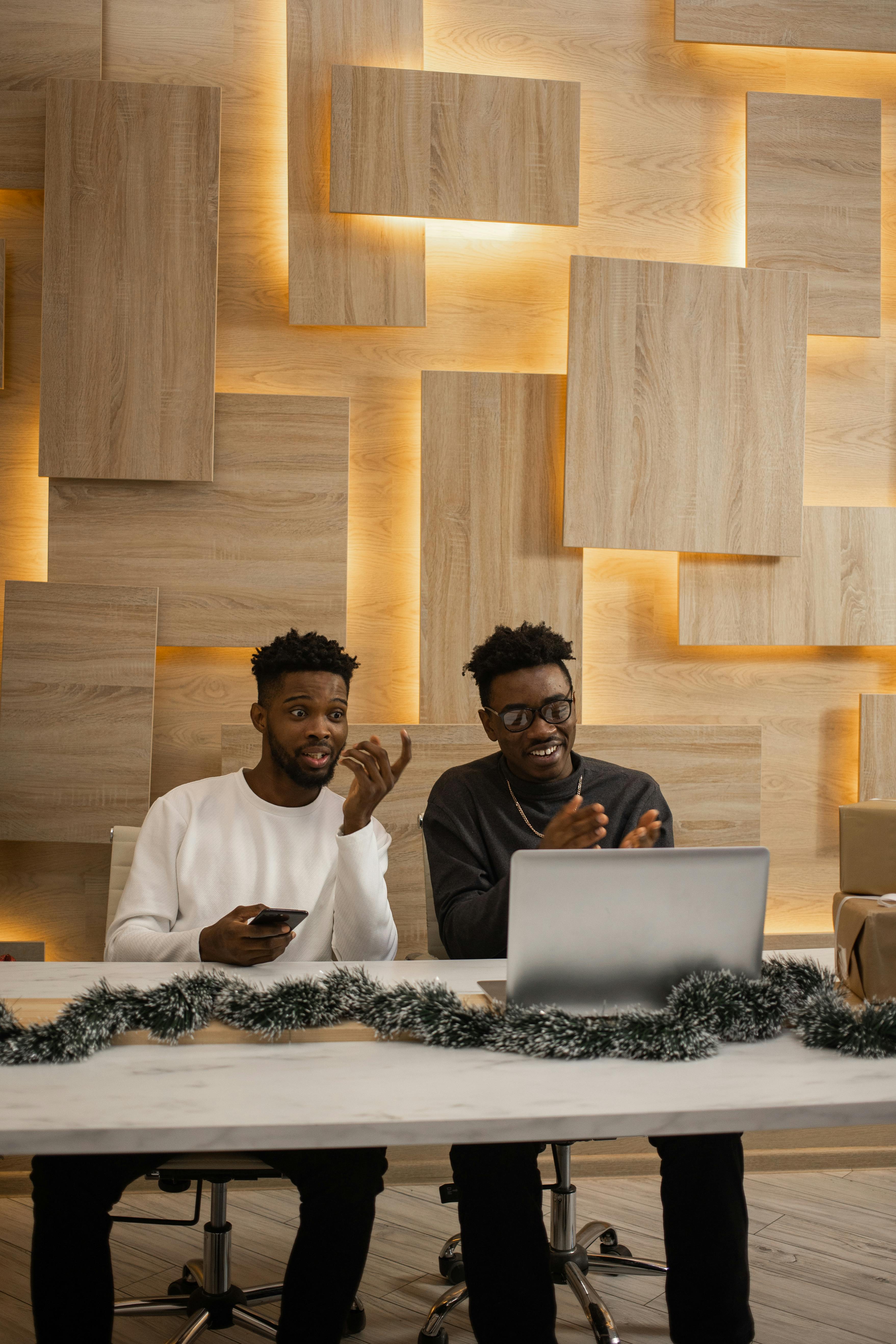 Men Sitting Beside Each Other · Free Stock Photo