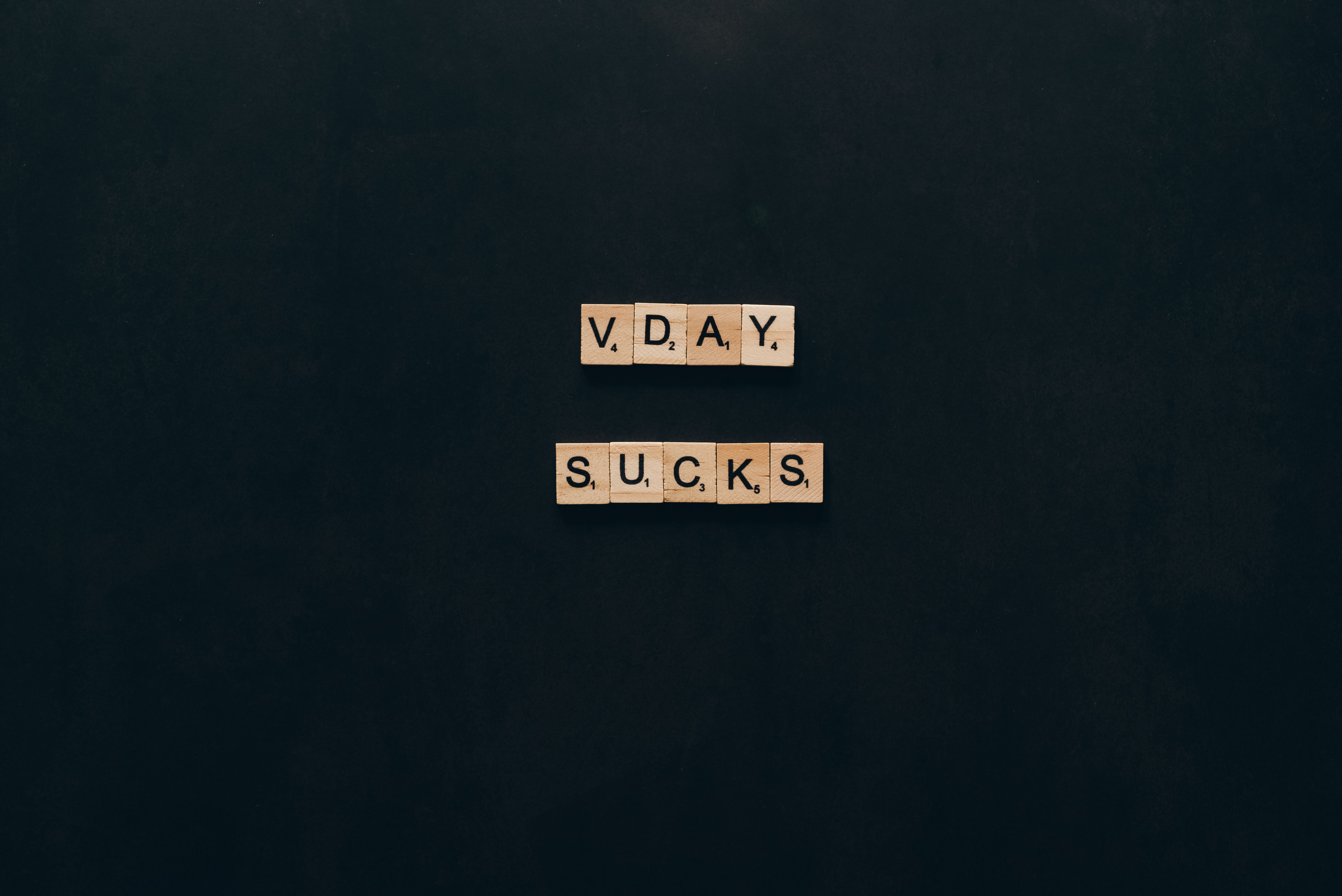 Wooden Scrabble Tiles on Black Background · Free Stock Photo