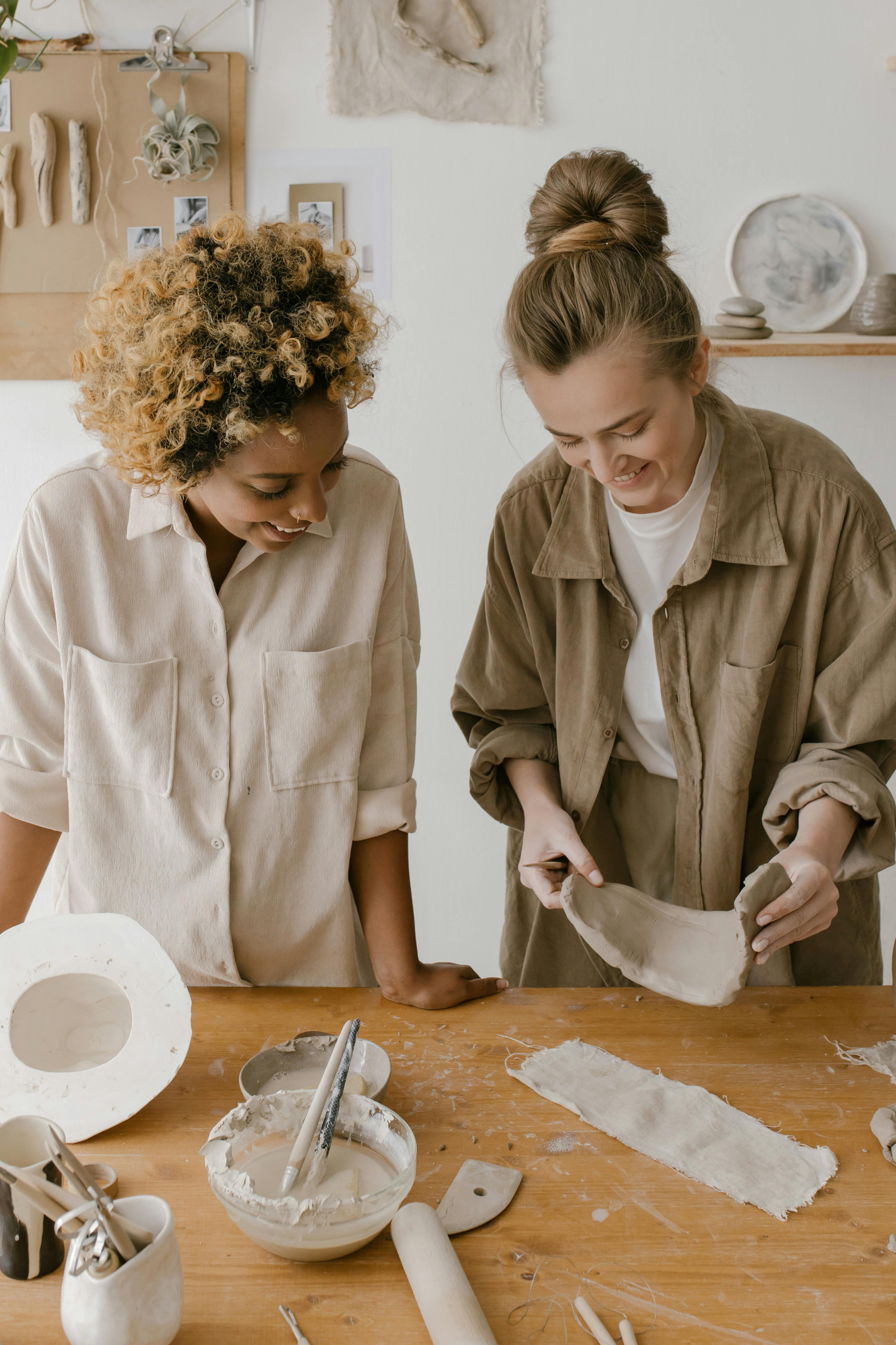 Women Molding a Clay · Free Stock Photo