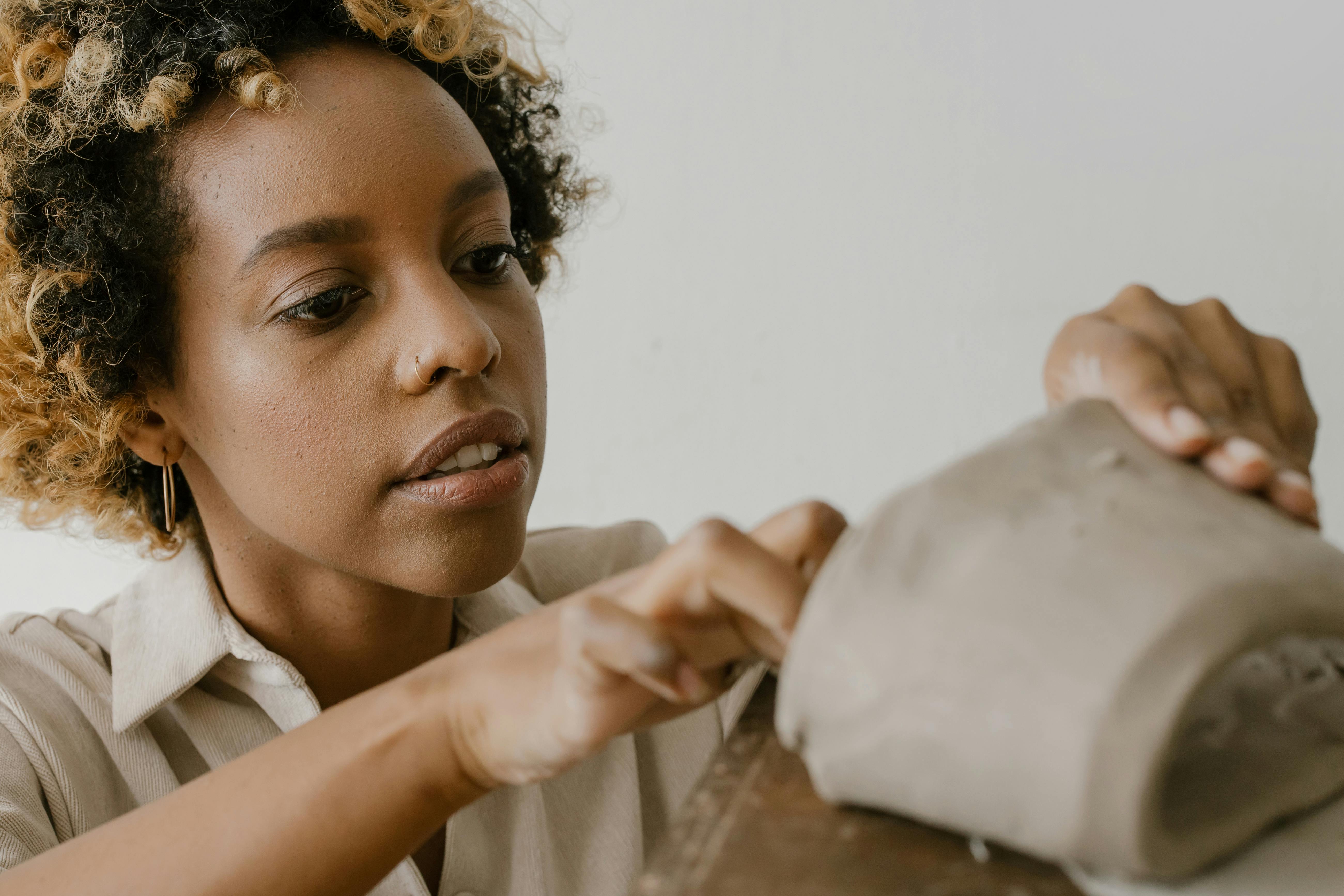 Women Molding a Clay · Free Stock Photo
