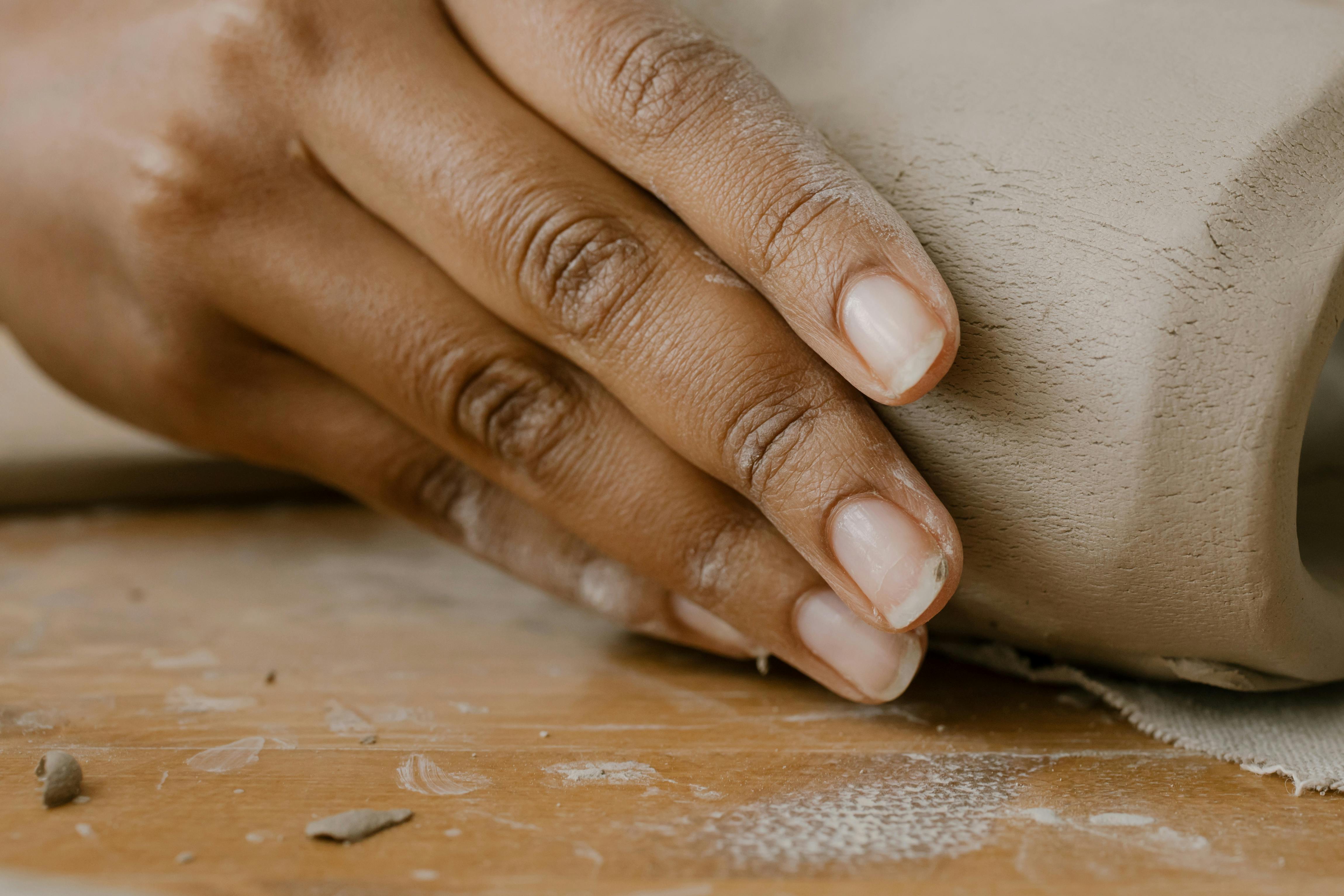 Women Molding a Clay · Free Stock Photo