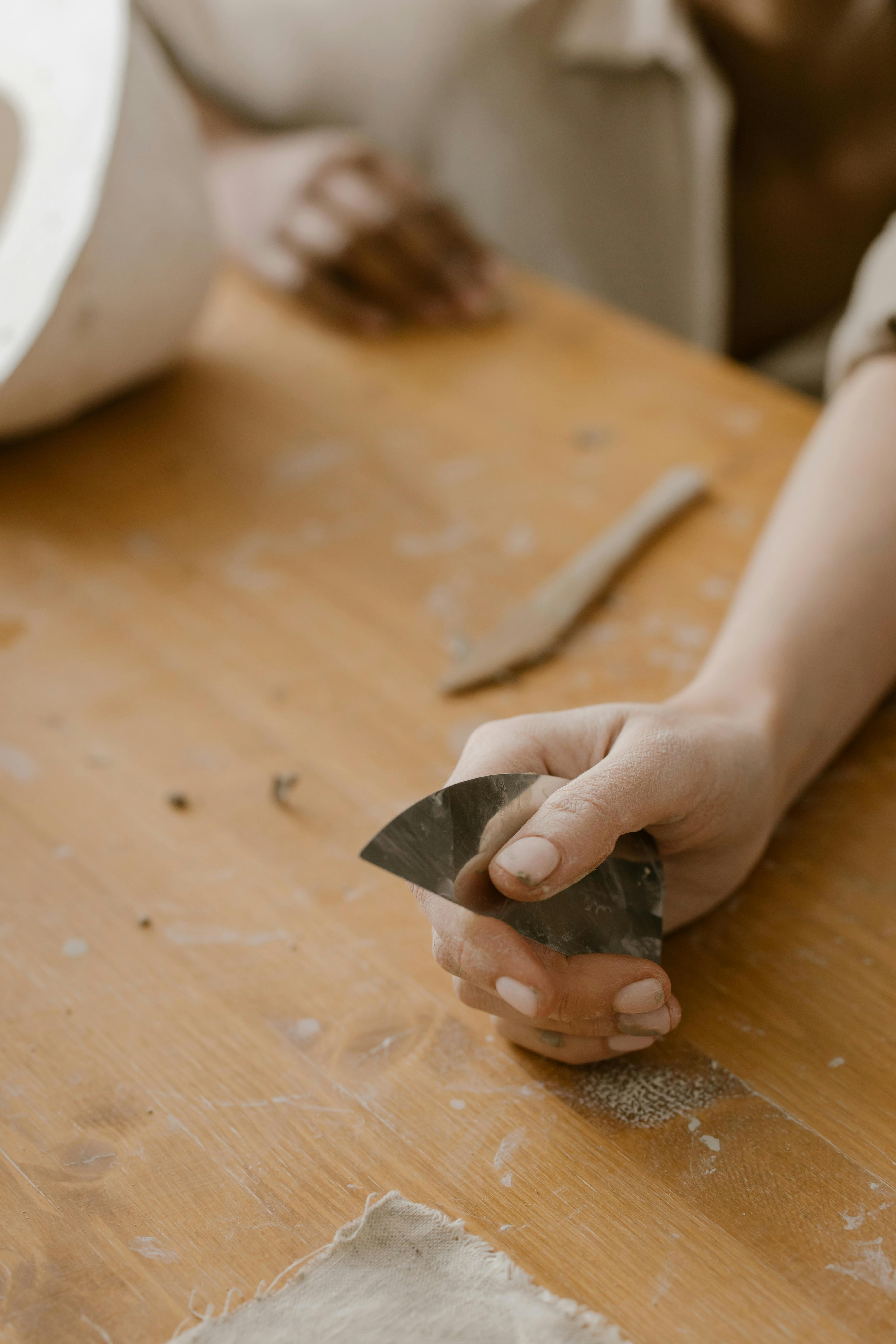 Person Making a Candle · Free Stock Photo