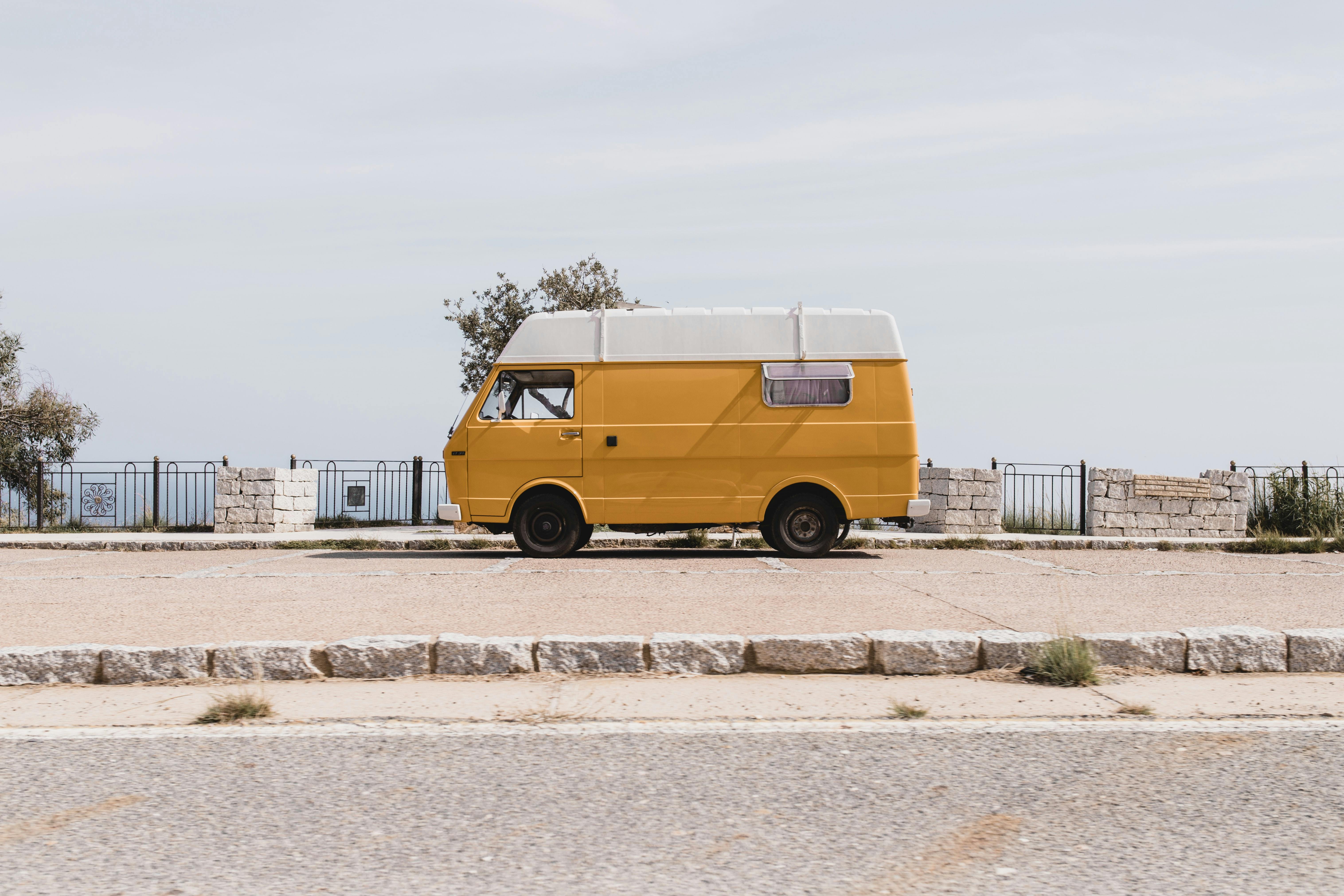 Parked Van in Front of House · Free Stock Photo