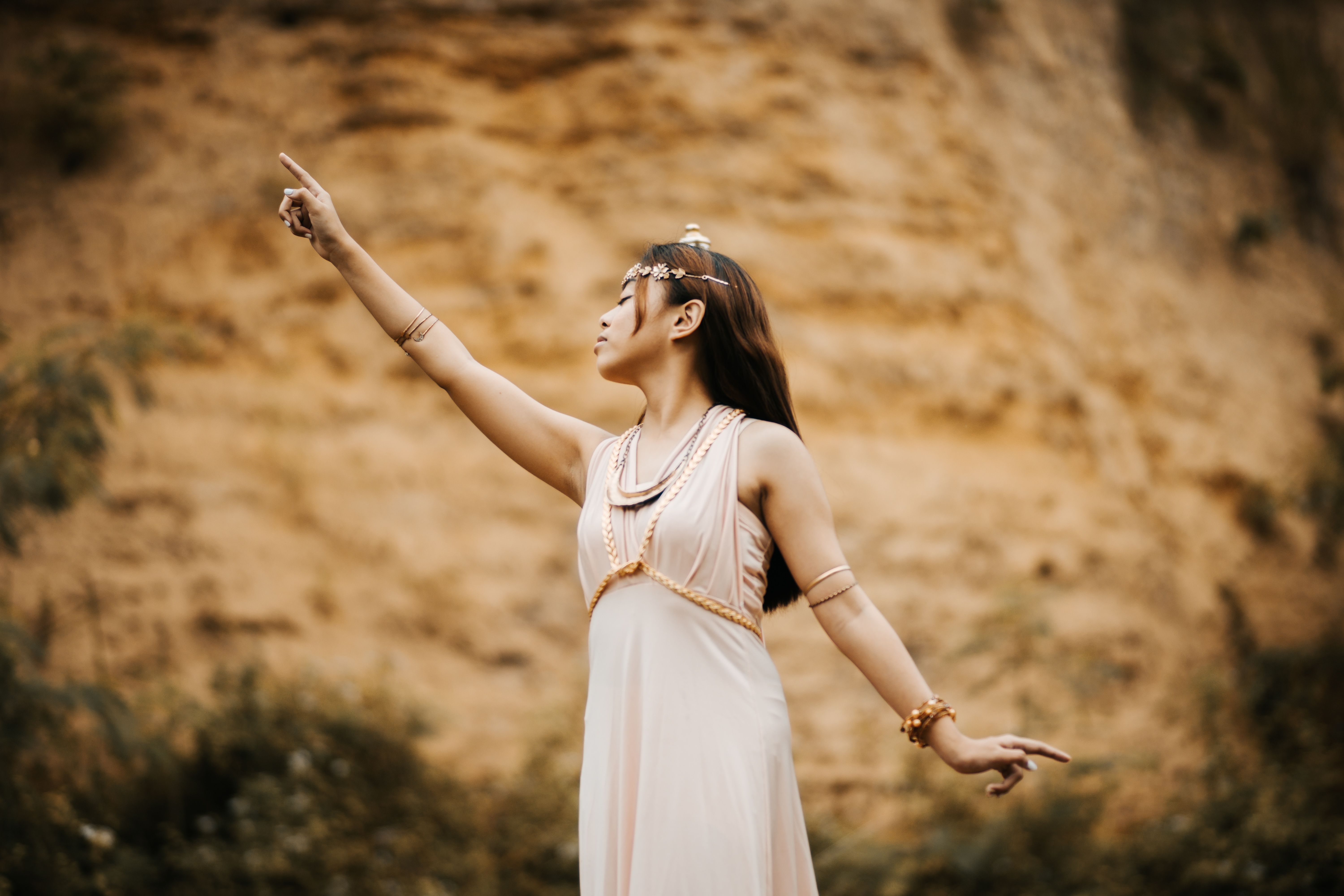 A Woman wearing Dress while Posing · Free Stock Photo