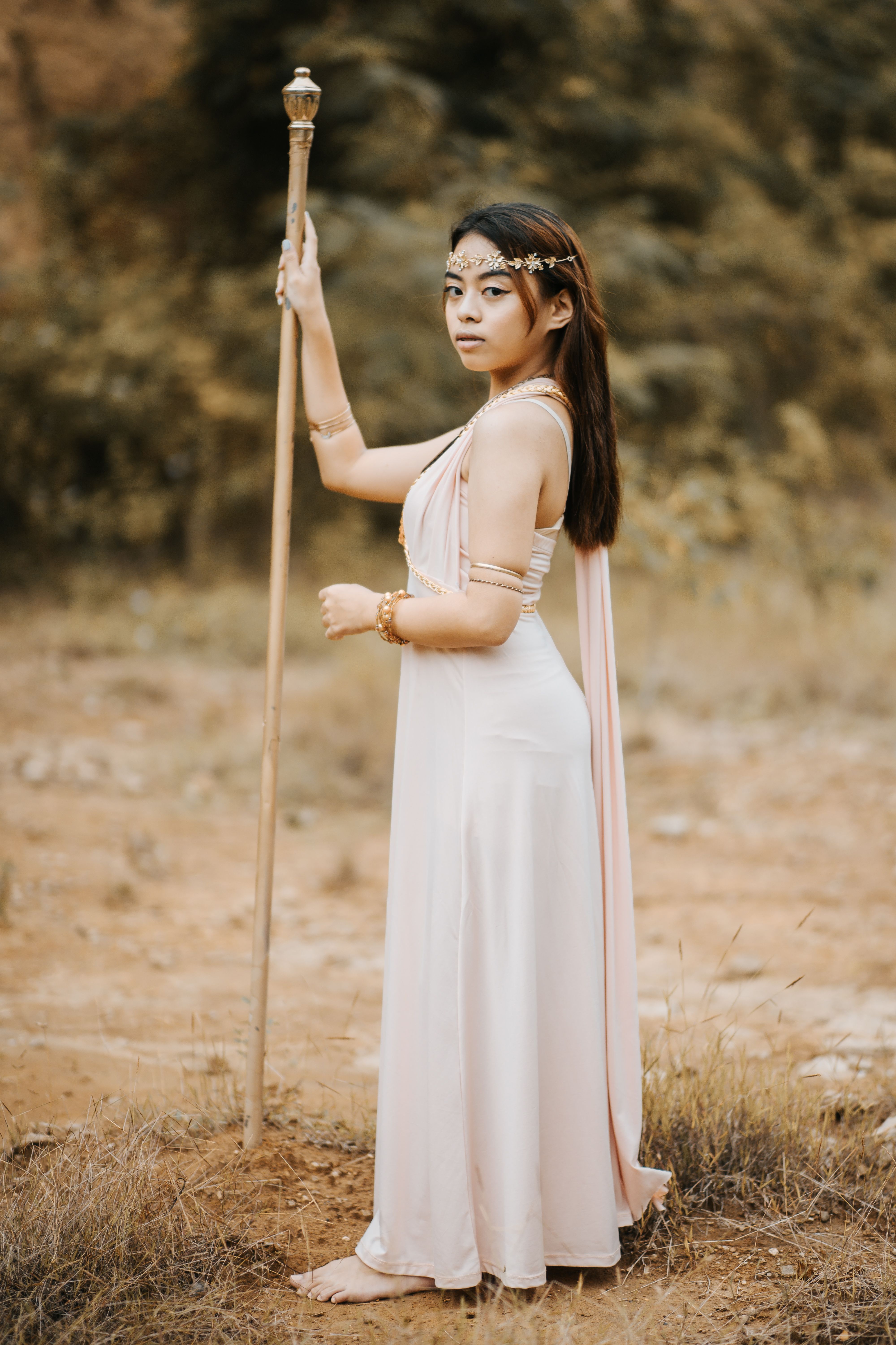 Young Female Cosplayer holding a Spear · Free Stock Photo