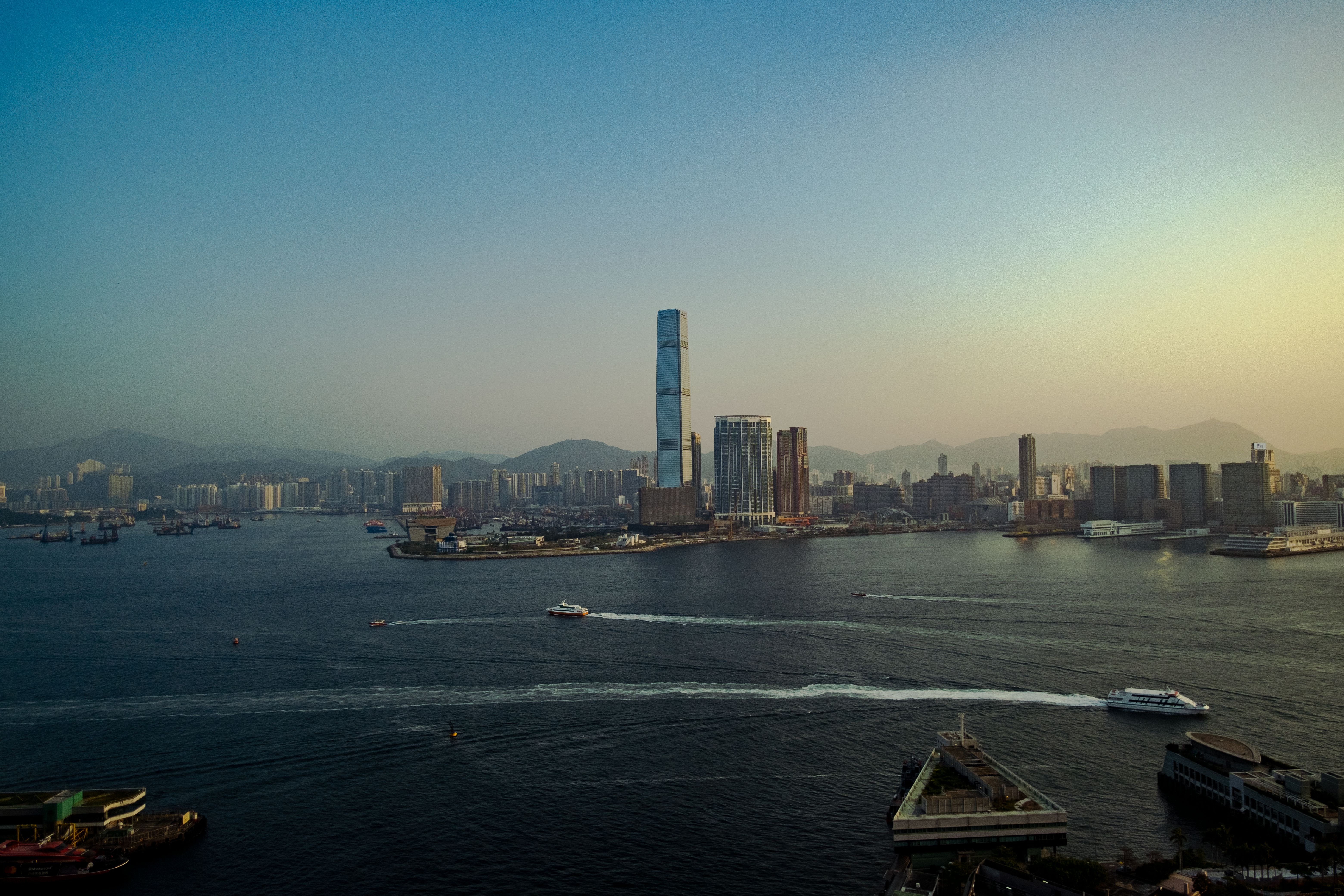 City Skyline Across Body of Water · Free Stock Photo