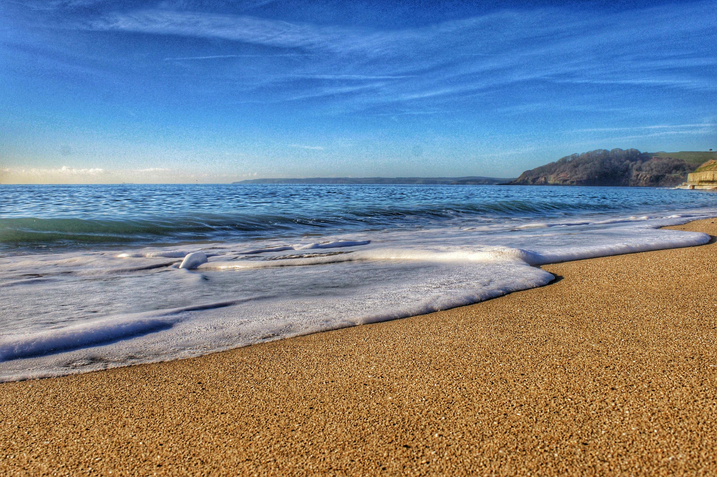 Sea Waves at Beach during Daytime · Free Stock Photo
