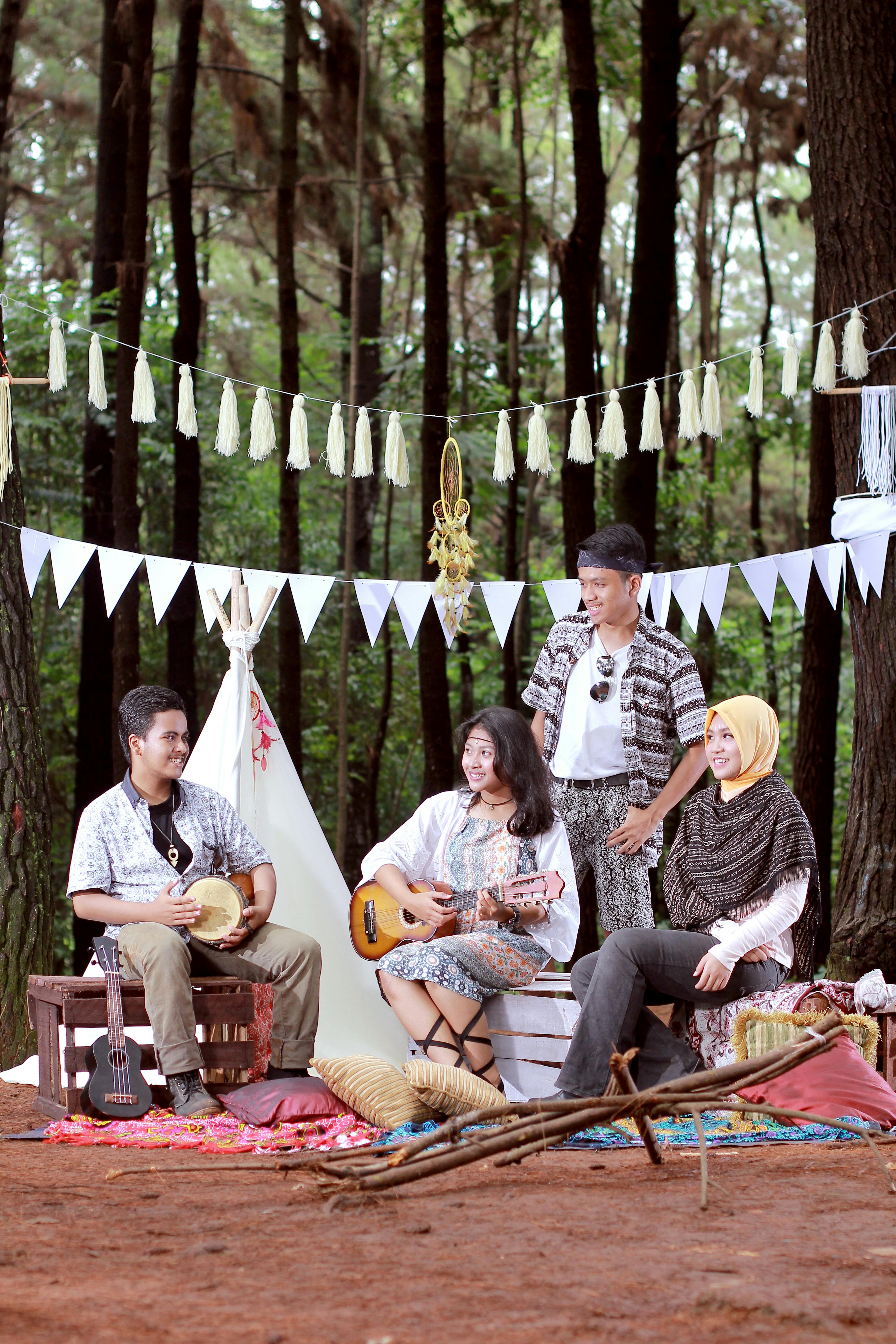 Happy Musicians in Boho Chic Outfits · Free Stock Photo