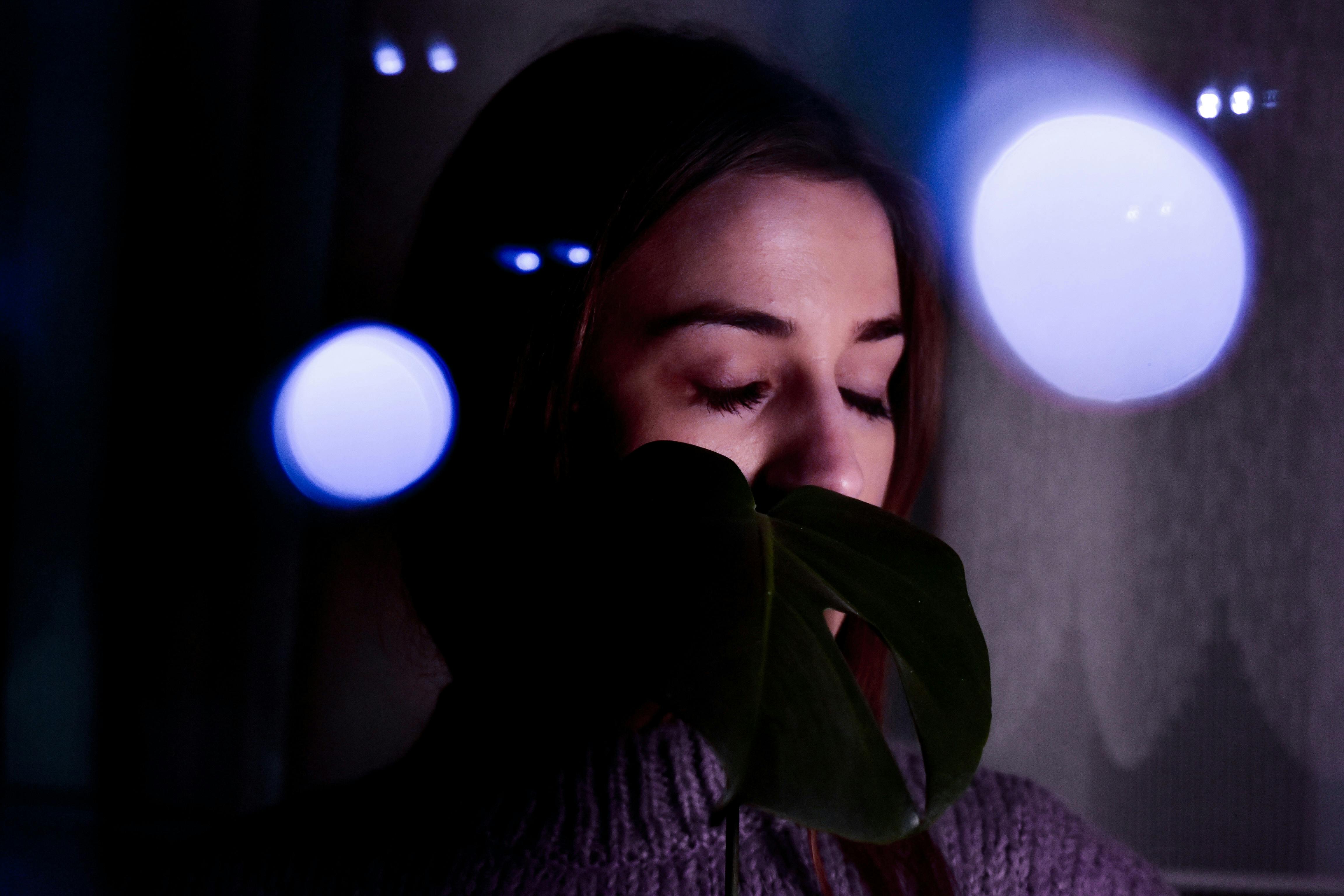 Tranquil feminine woman with makeup and closed eyes · Free Stock Photo