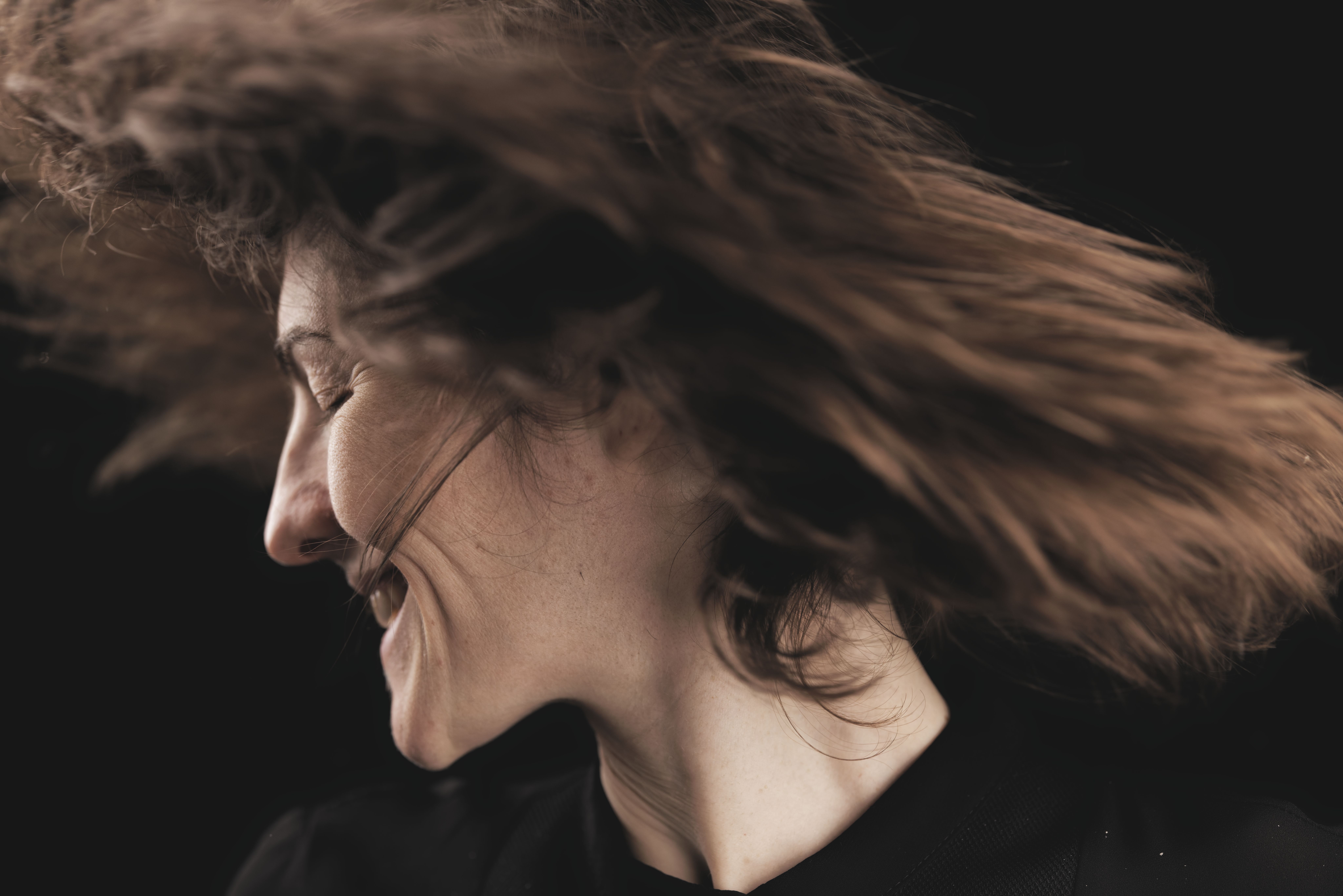 Photo of Woman Doing Hair Flip · Free Stock Photo