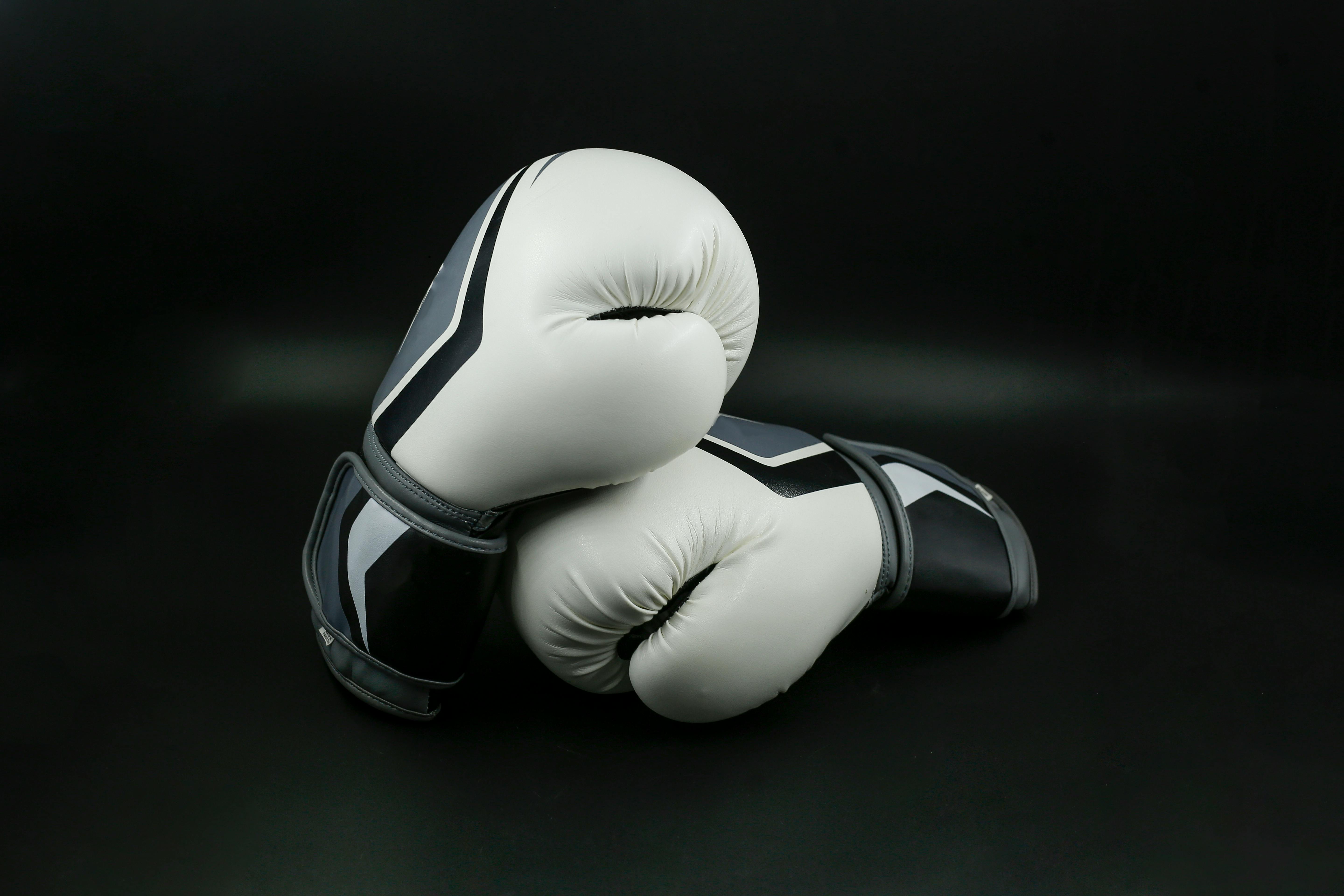 Black Leather Boxing Gloves on the Floor · Free Stock Photo