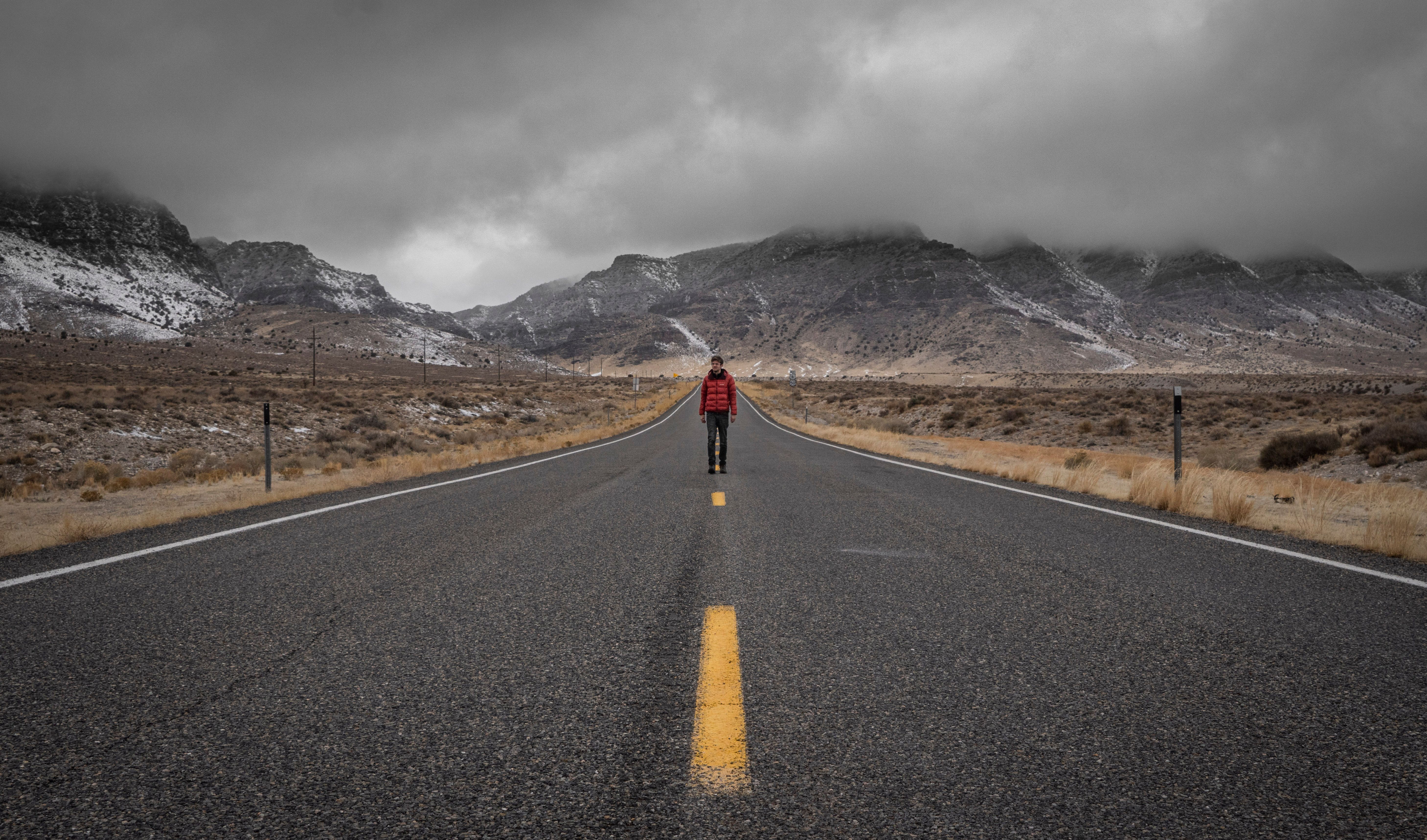 A Man Standing on the Road · Free Stock Photo