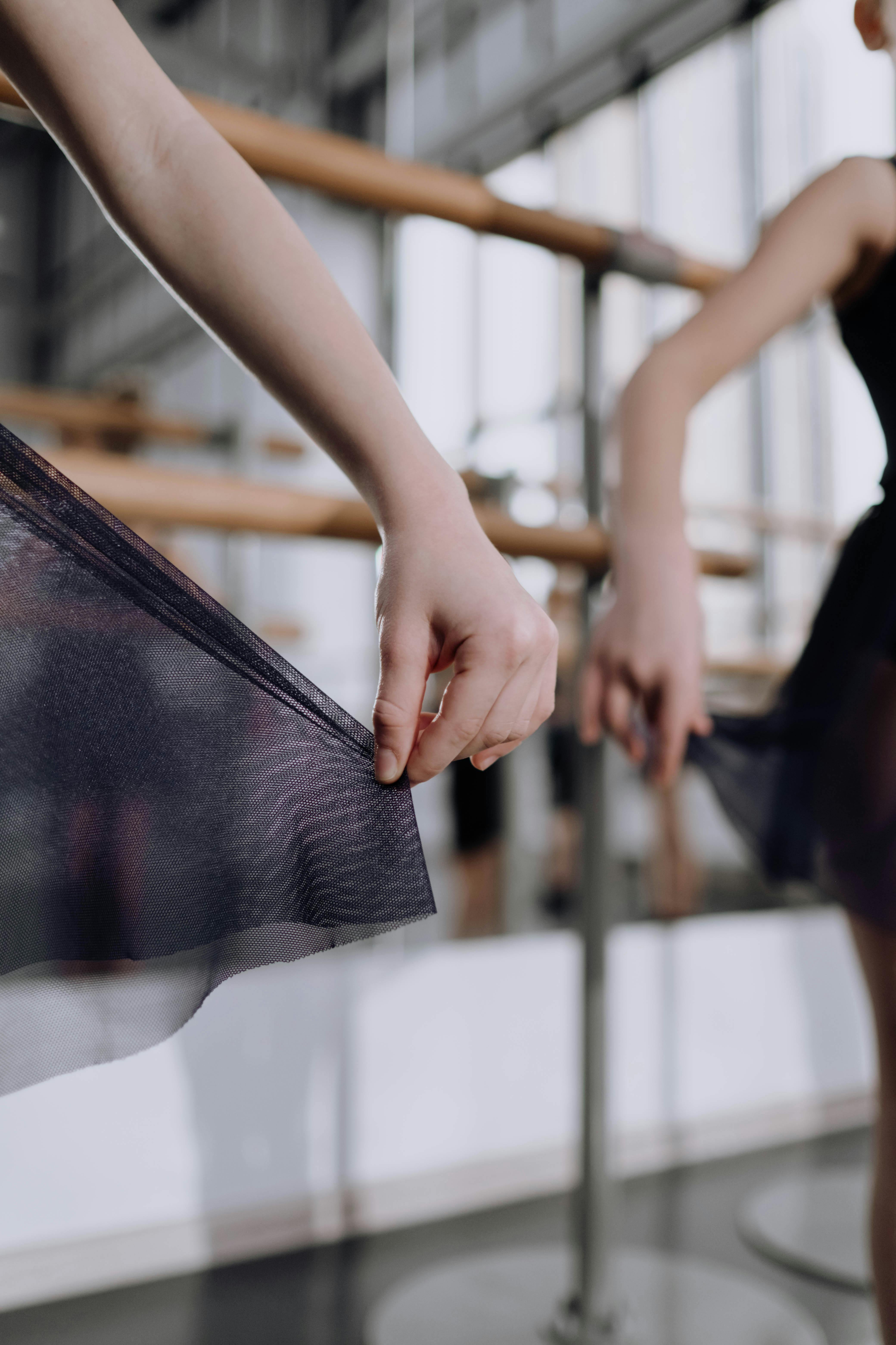 Ballet Dancers Hands Holding Their Tutu · Free Stock Photo