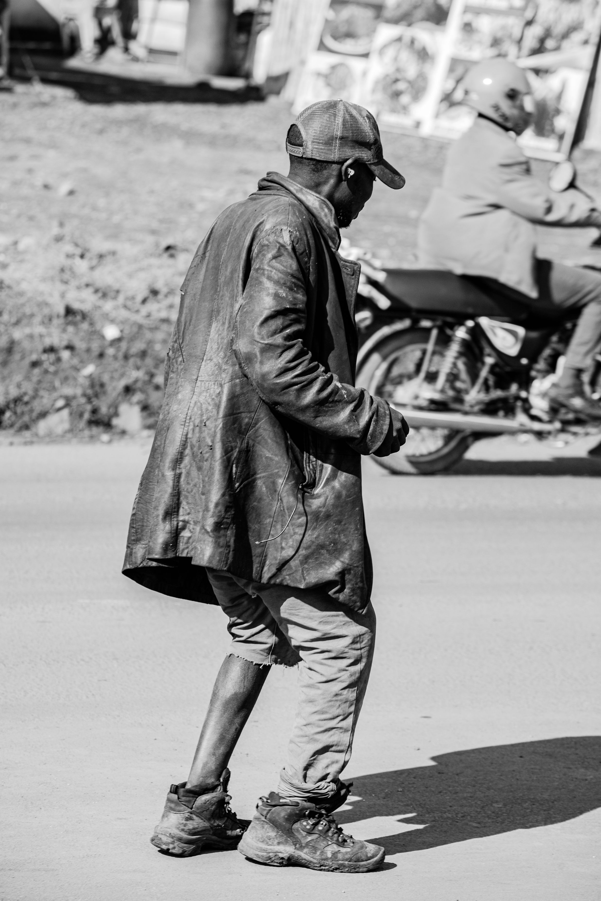 Grayscale Photo of a Person's Back · Free Stock Photo