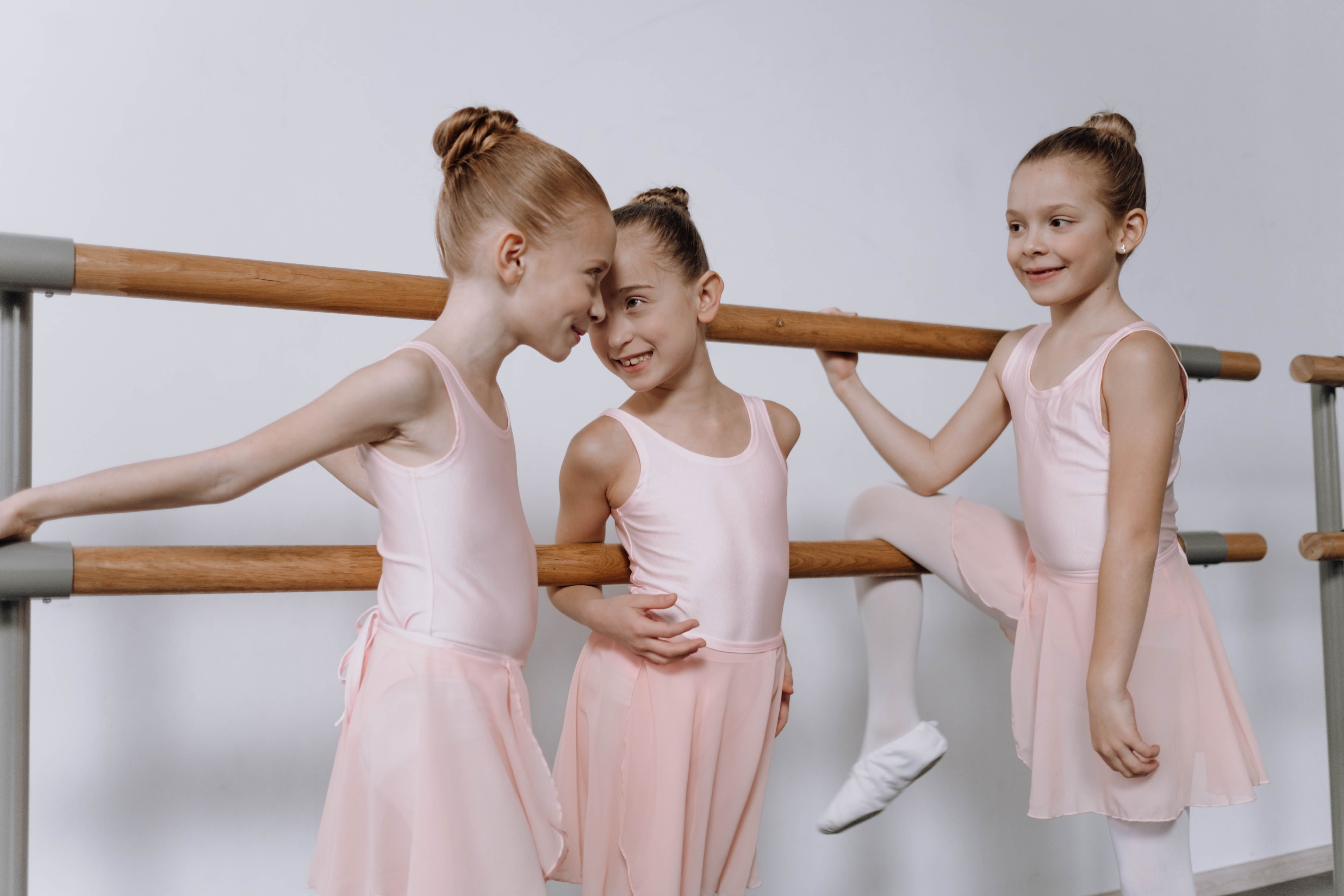 Ballet Dancers Talking on a Ballet Studio · Free Stock Photo
