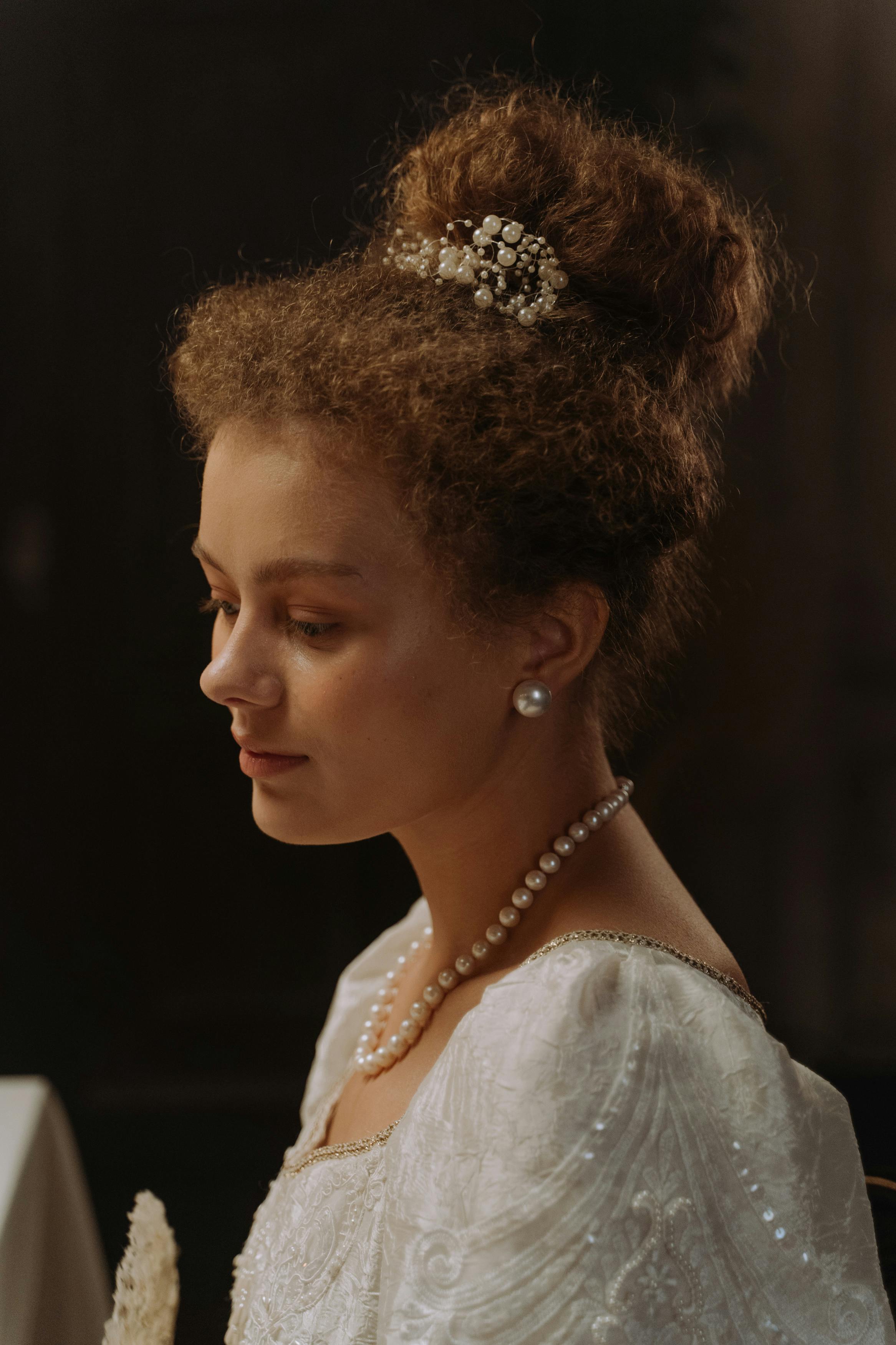 Woman Touching Gold Necklace · Free Stock Photo