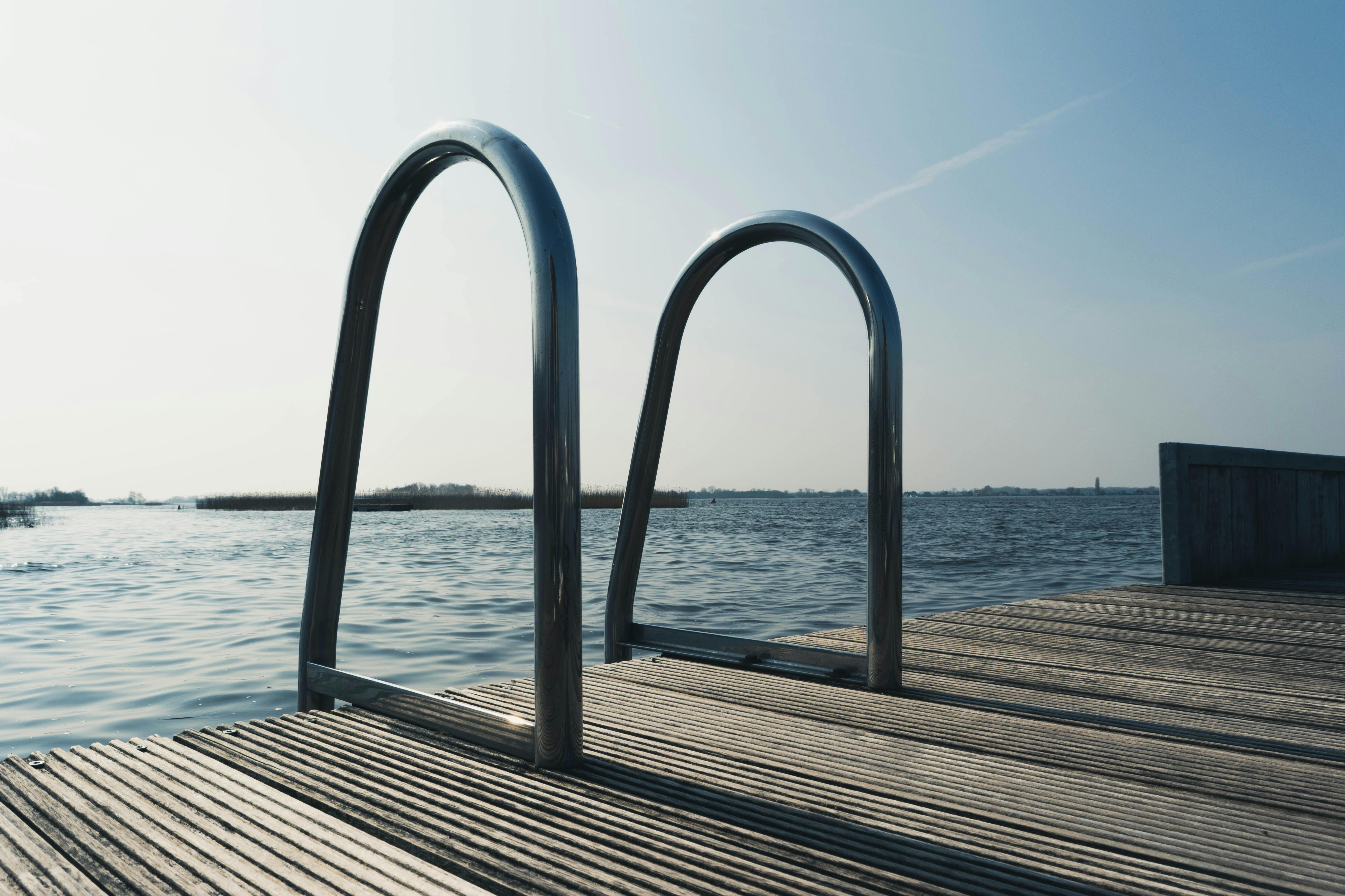 Gray Stainless Steel Pool Ladder · Free Stock Photo