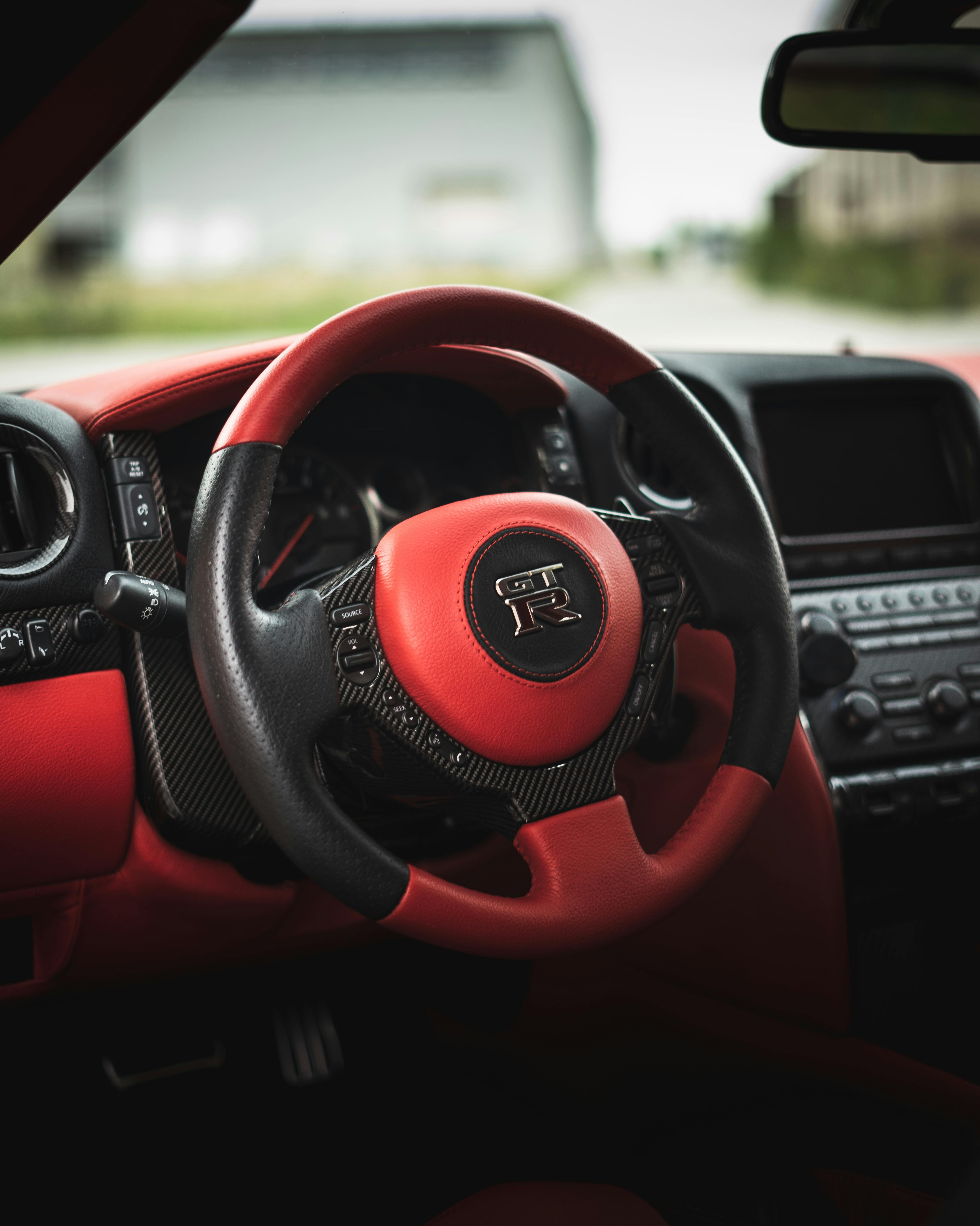 Red and Black GTR Steering Wheel · Free Stock Photo