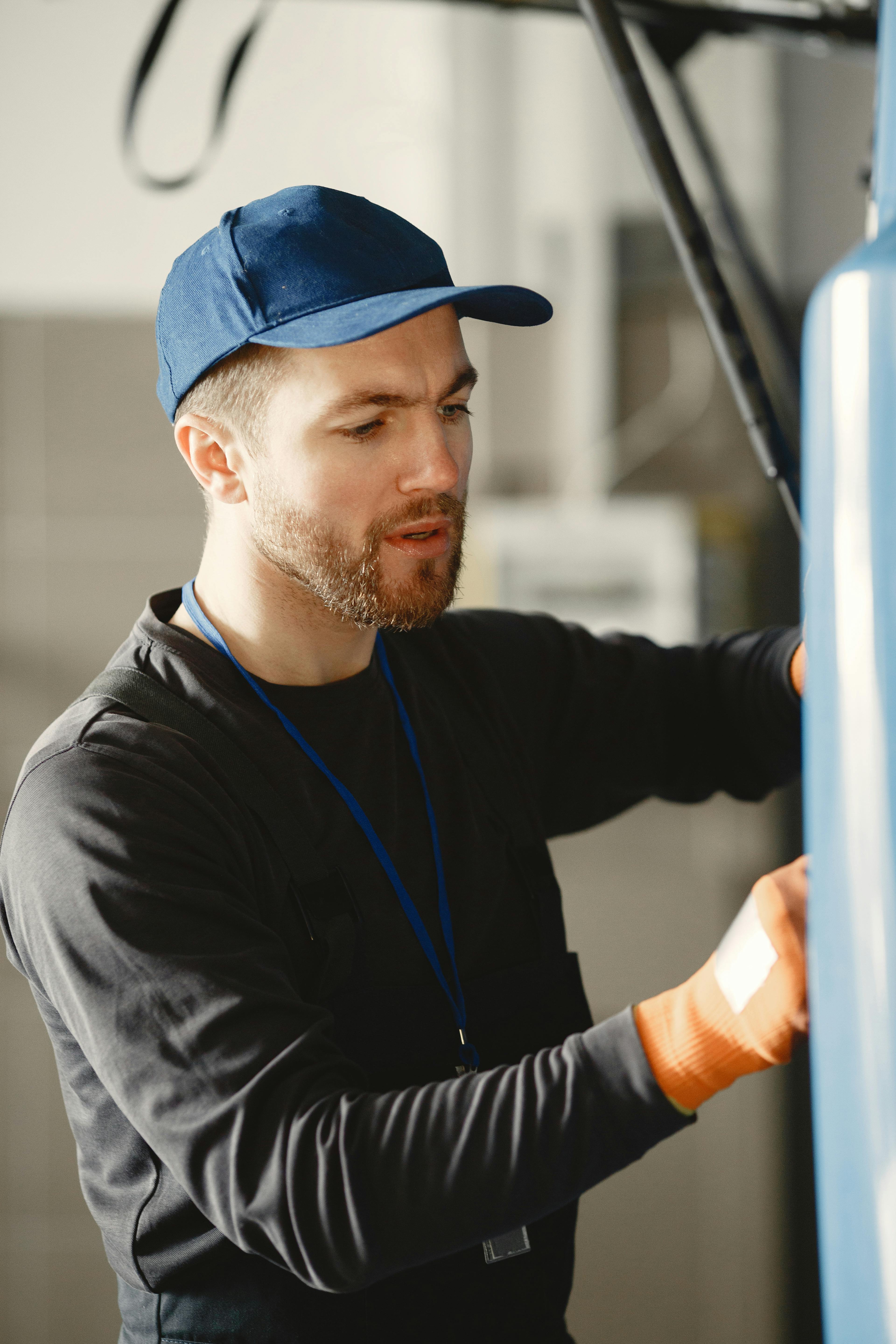A Man in Blue Cap · Free Stock Photo