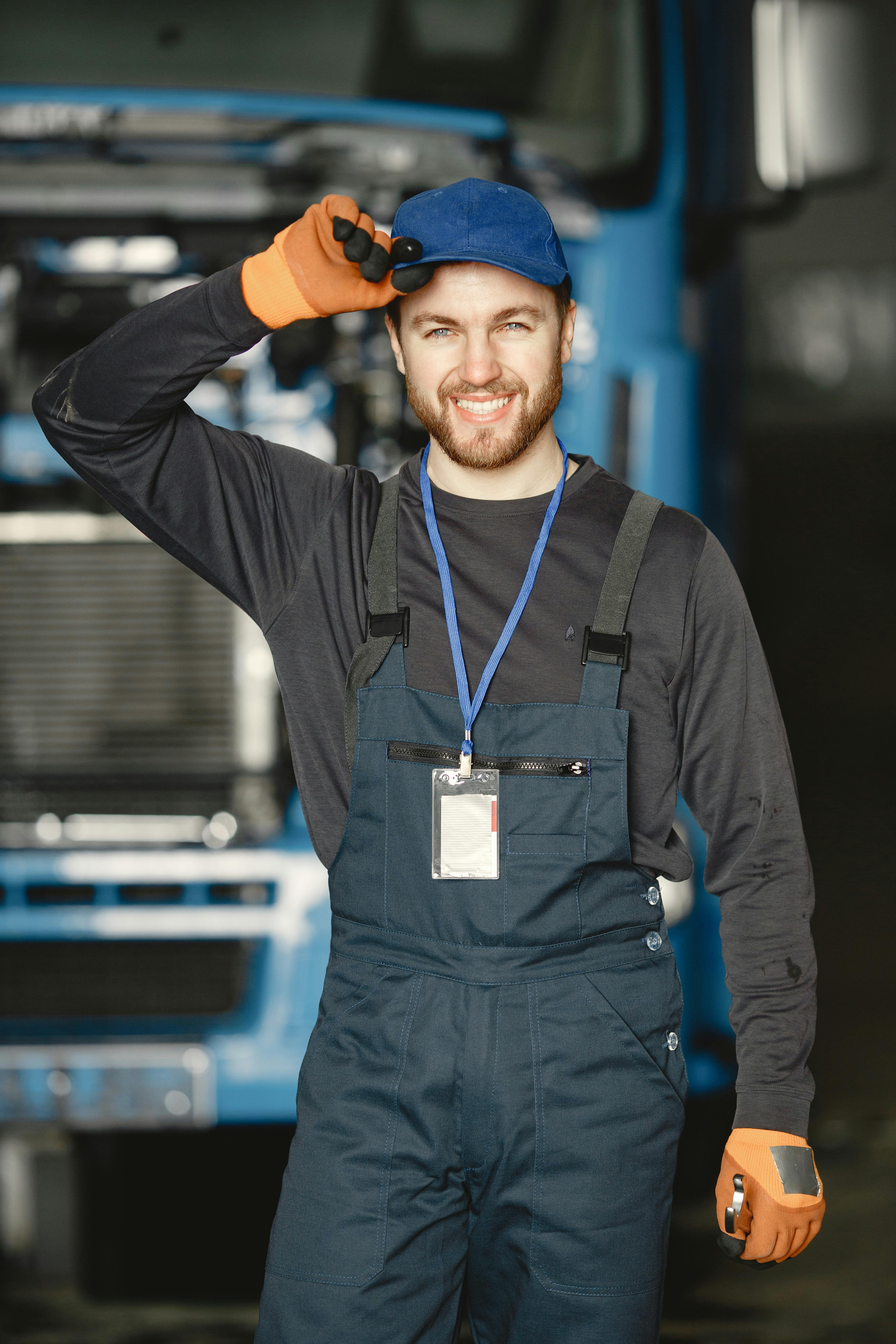 Anonymous worker in heavy duty gloves · Free Stock Photo