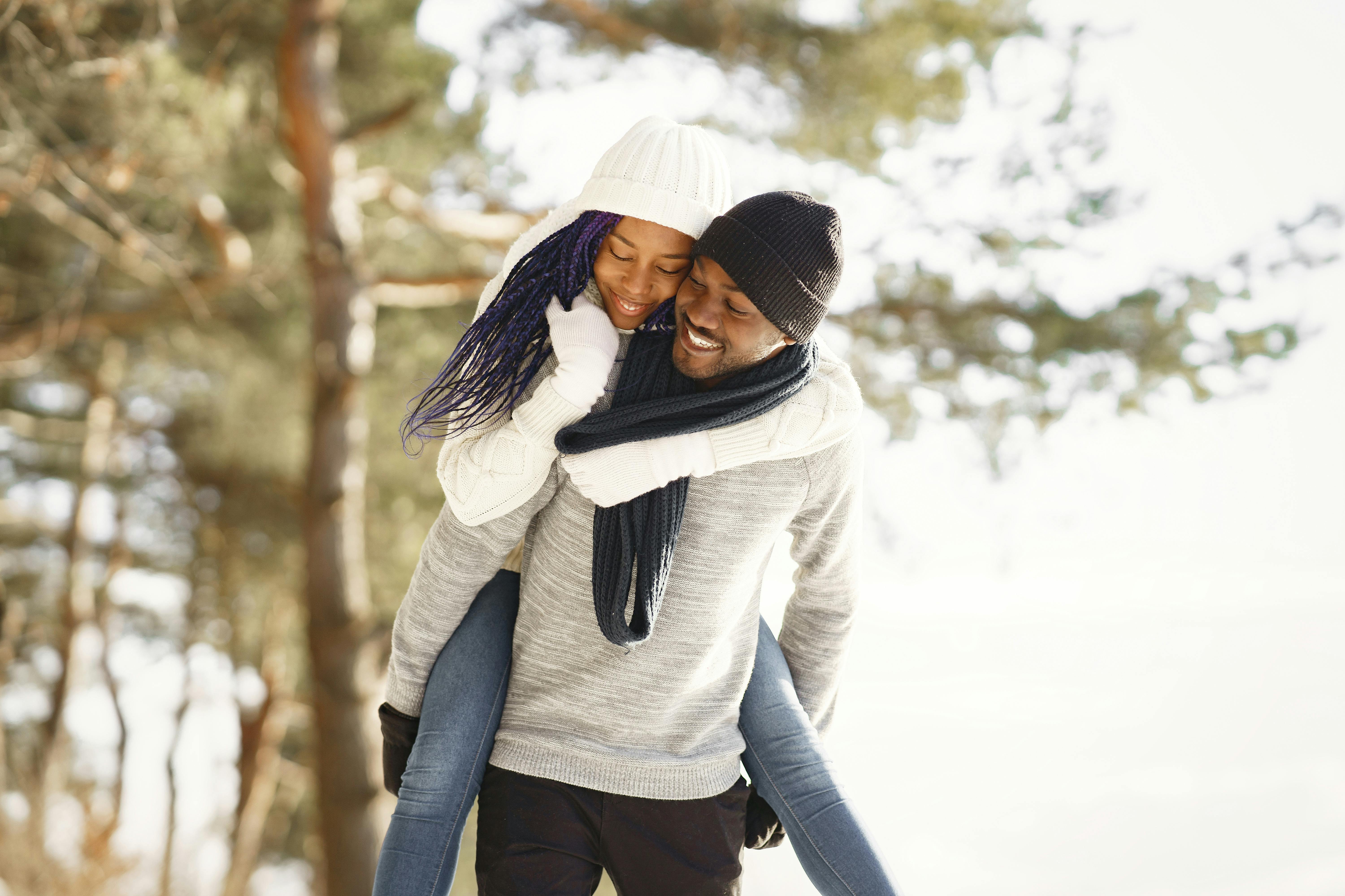 A Man Carrying His Partner · Free Stock Photo